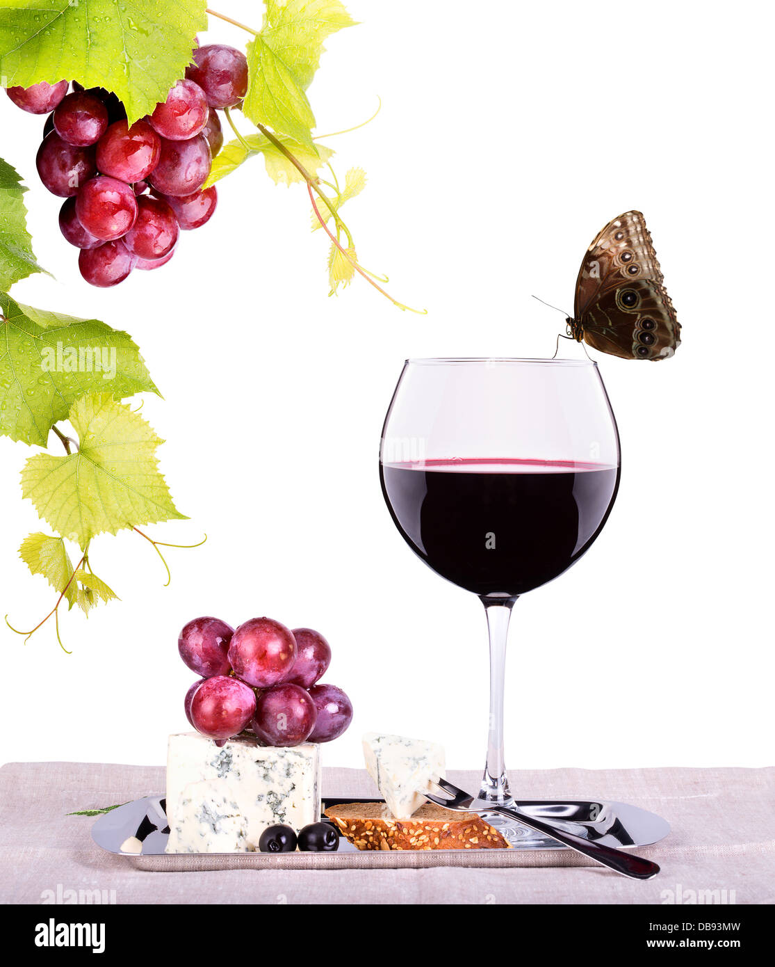 bottles and glasses of wine, assortment of grapes and cheese isolated ...