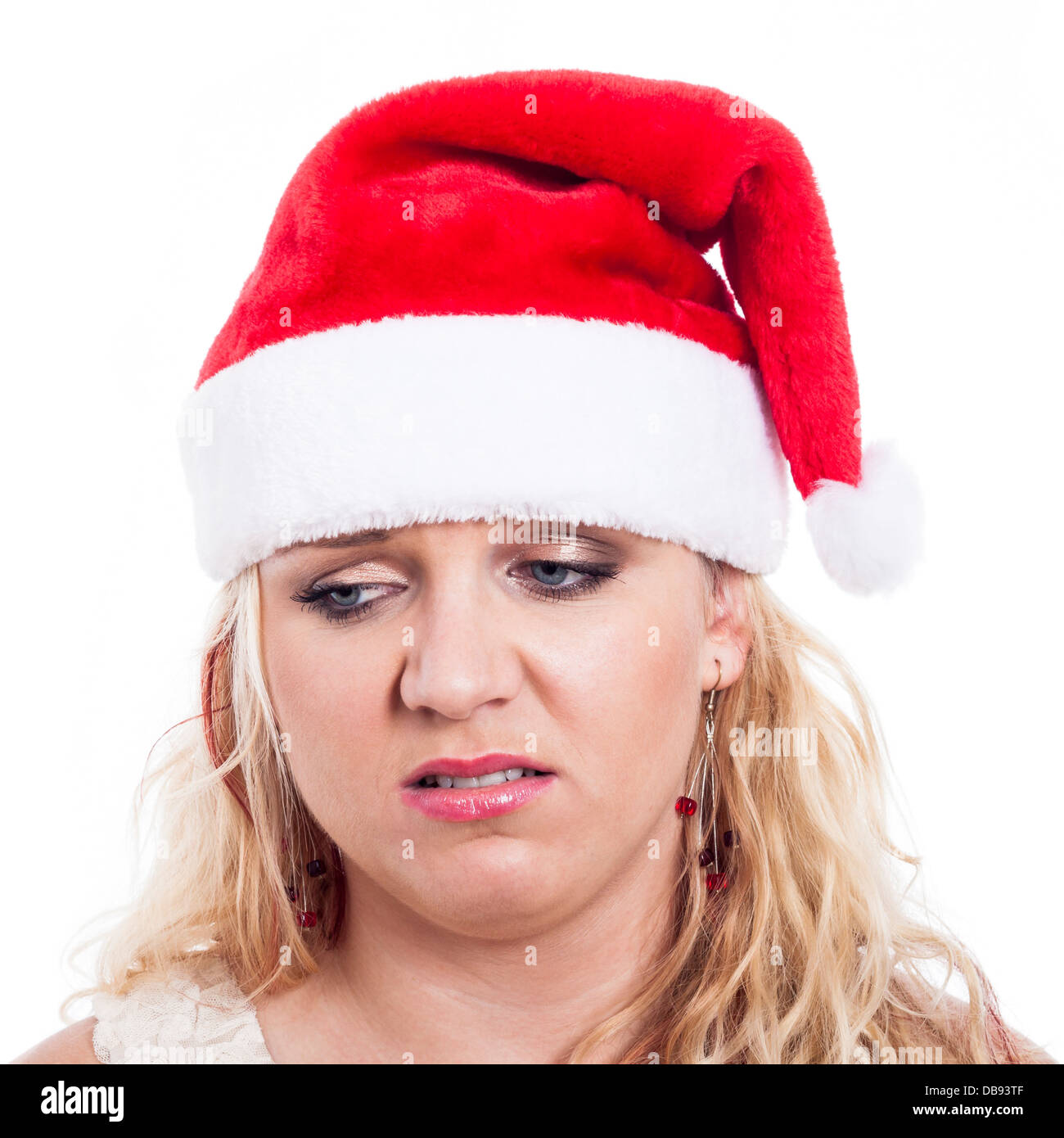 Disappointed woman in Christmas hat, isolated on white background Stock ...