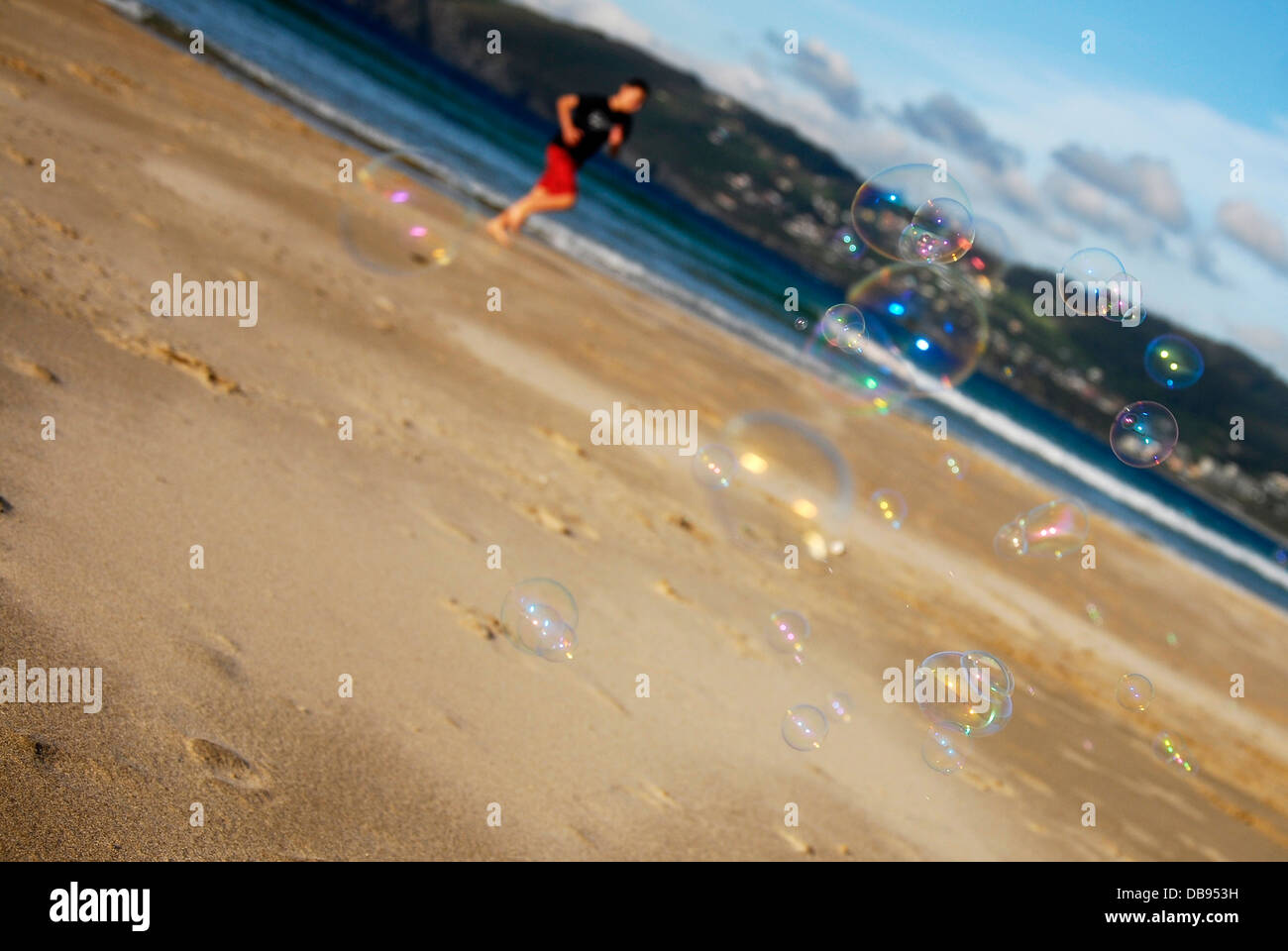 bubbles on the sand at lonely beach Stock Photo - Alamy
