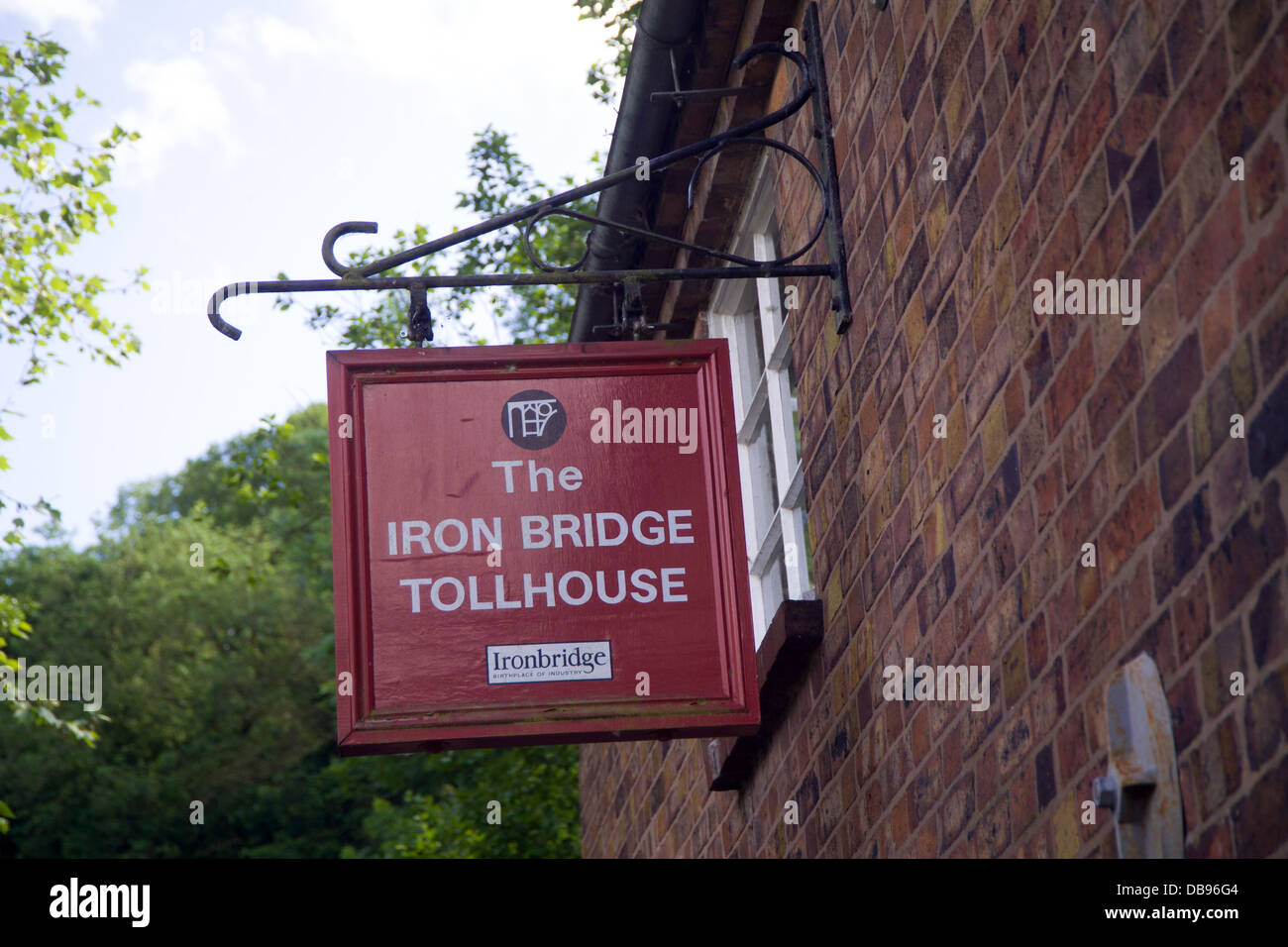 sign post for the Toll House The Iron Bridge crosses the River Severn ...