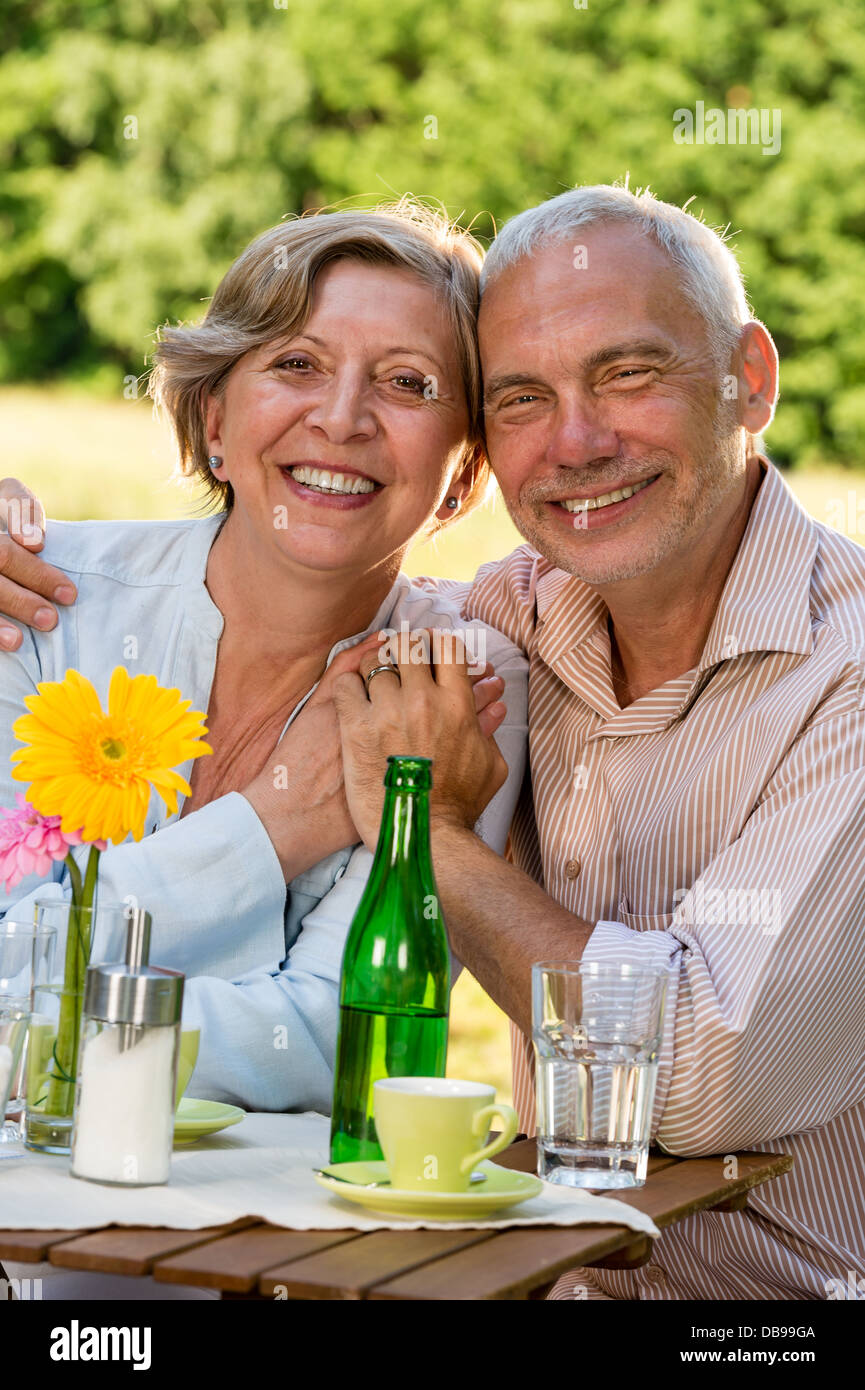 Cheerful senior couple holding hands hi-res stock photography and ...