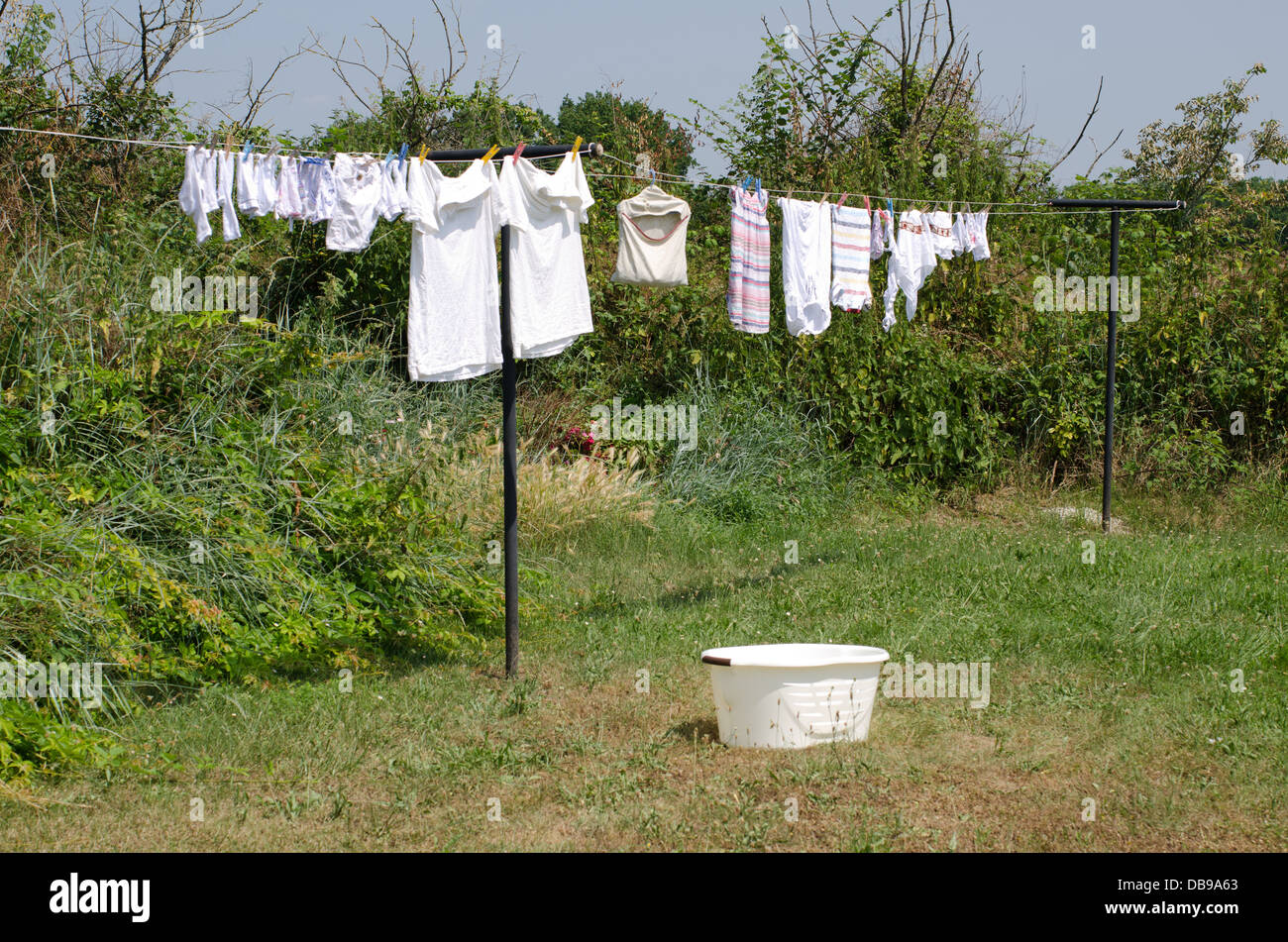 Air drying wet clothing hi-res stock photography and images - Alamy