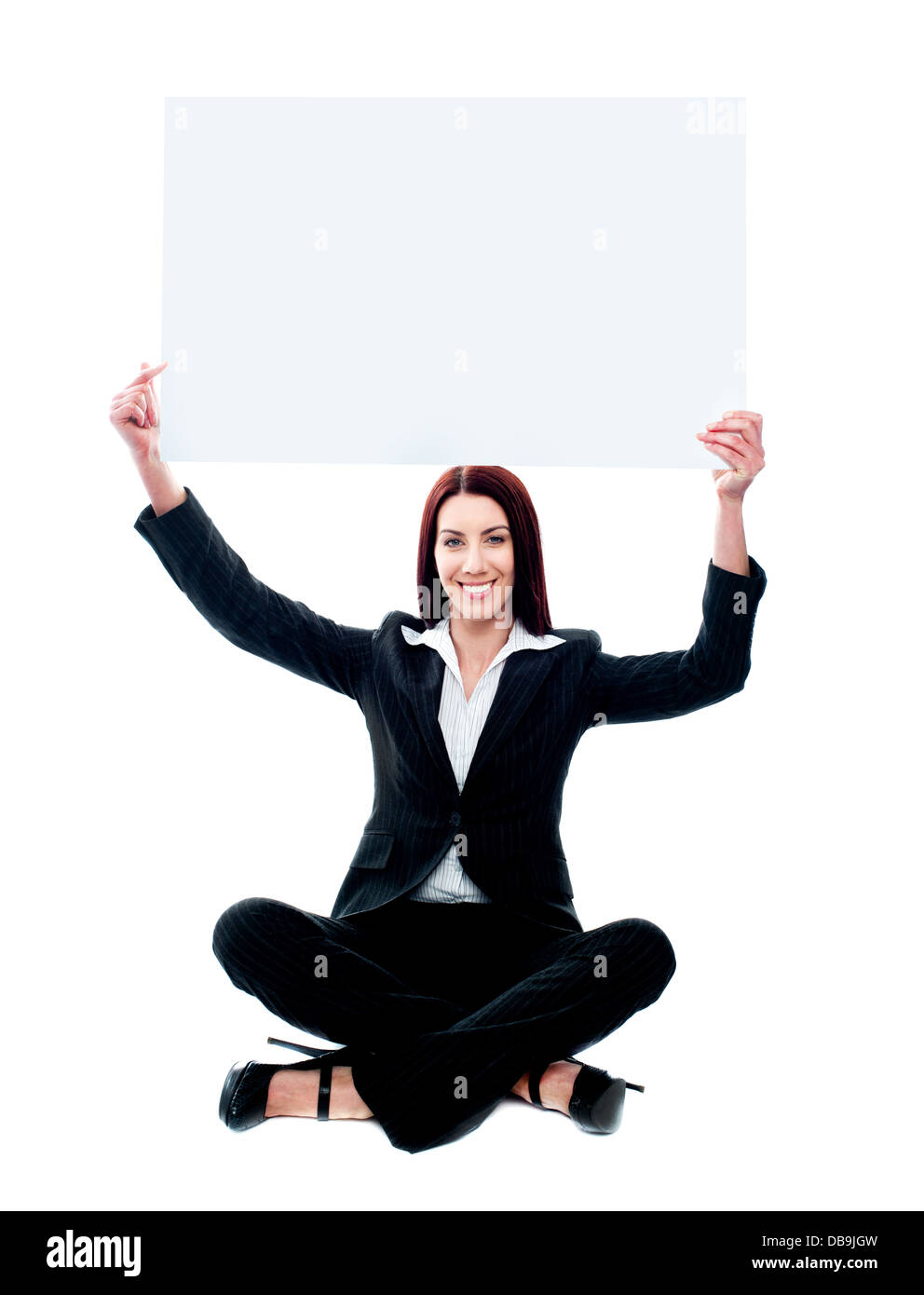 Corporate lady showing ad board Stock Photo - Alamy