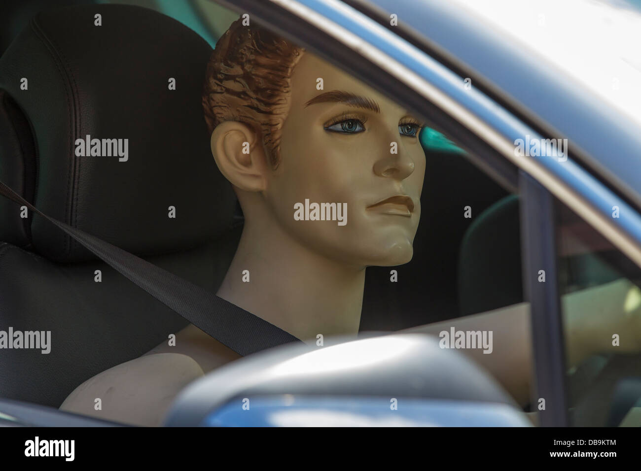 Mannequin in Drivers Seat of a car Stock Photo - Alamy