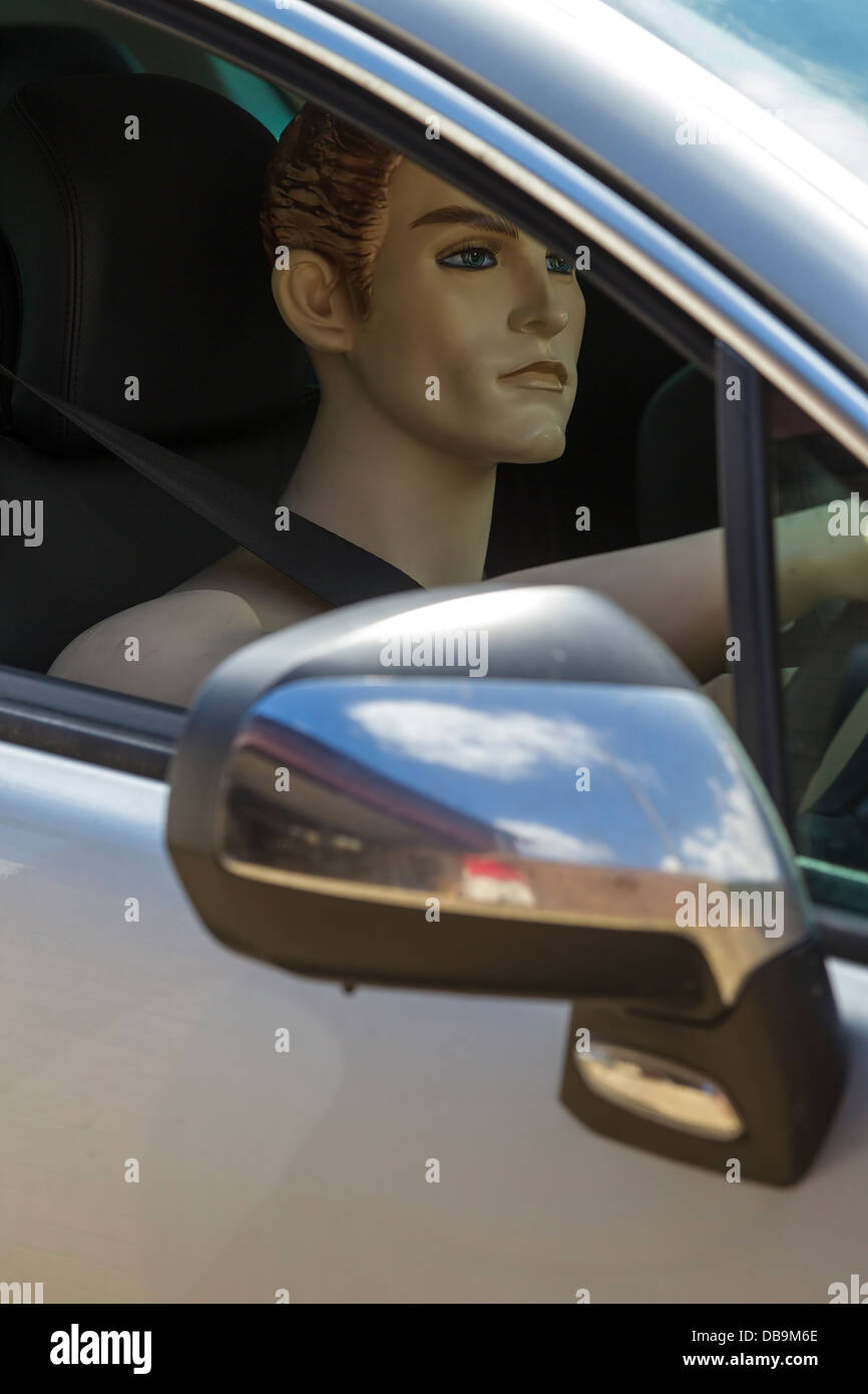 Mannequin in Drivers Seat of a car Stock Photo - Alamy