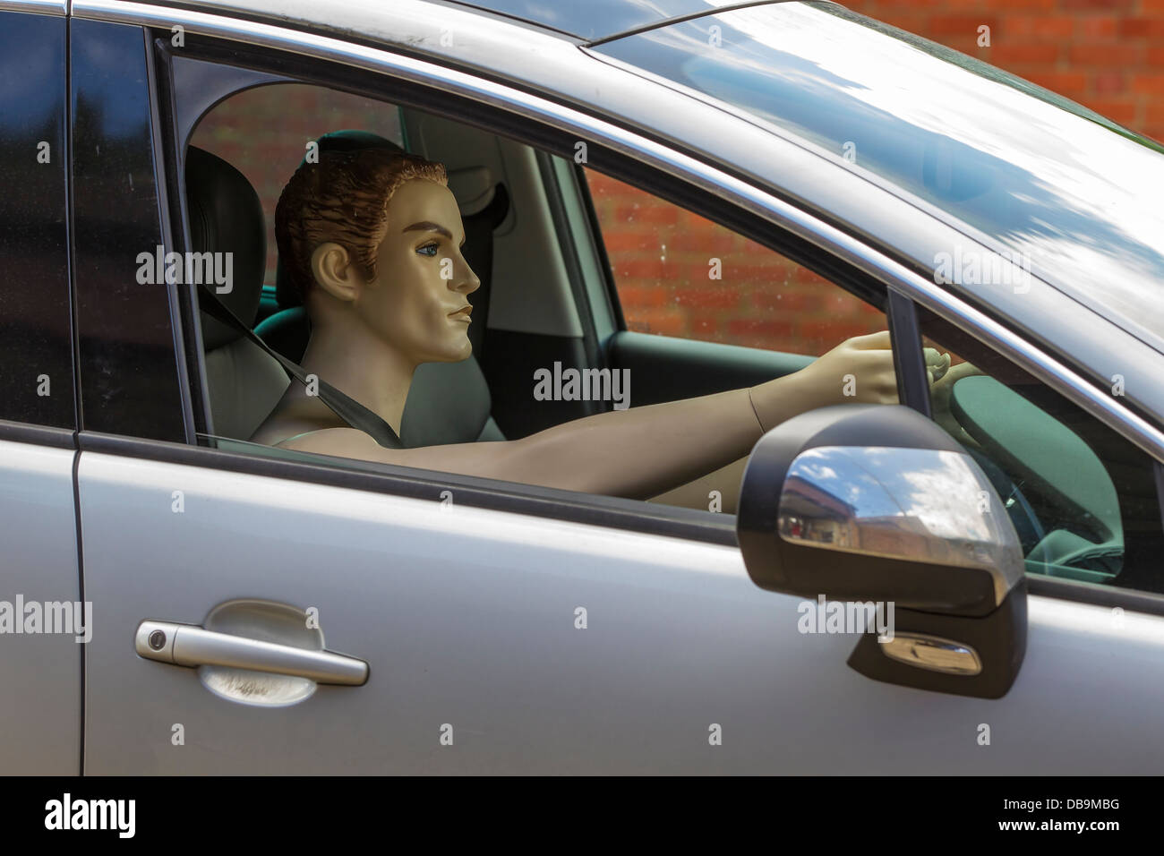 Mannequin in Drivers Seat of a car Stock Photo - Alamy