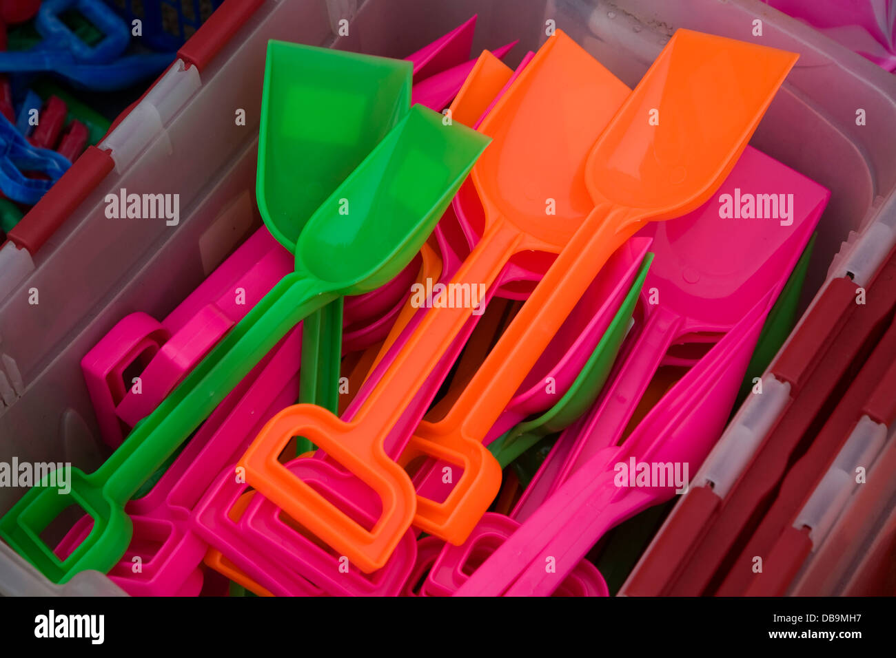 Seaside plastic spades on sale Cromer Norfolk England Stock Photo - Alamy
