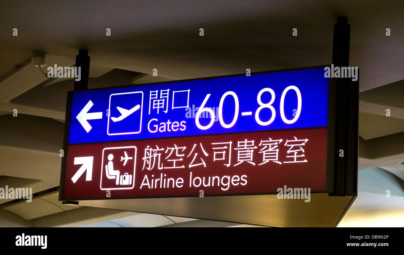Gates and airlines lounges signs in Hong Kong airport Stock Photo - Alamy