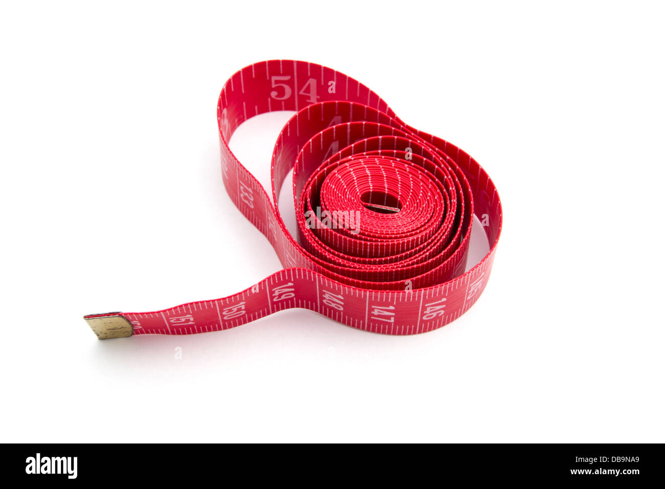 Red tape measure closeup on white background Stock Photo - Alamy