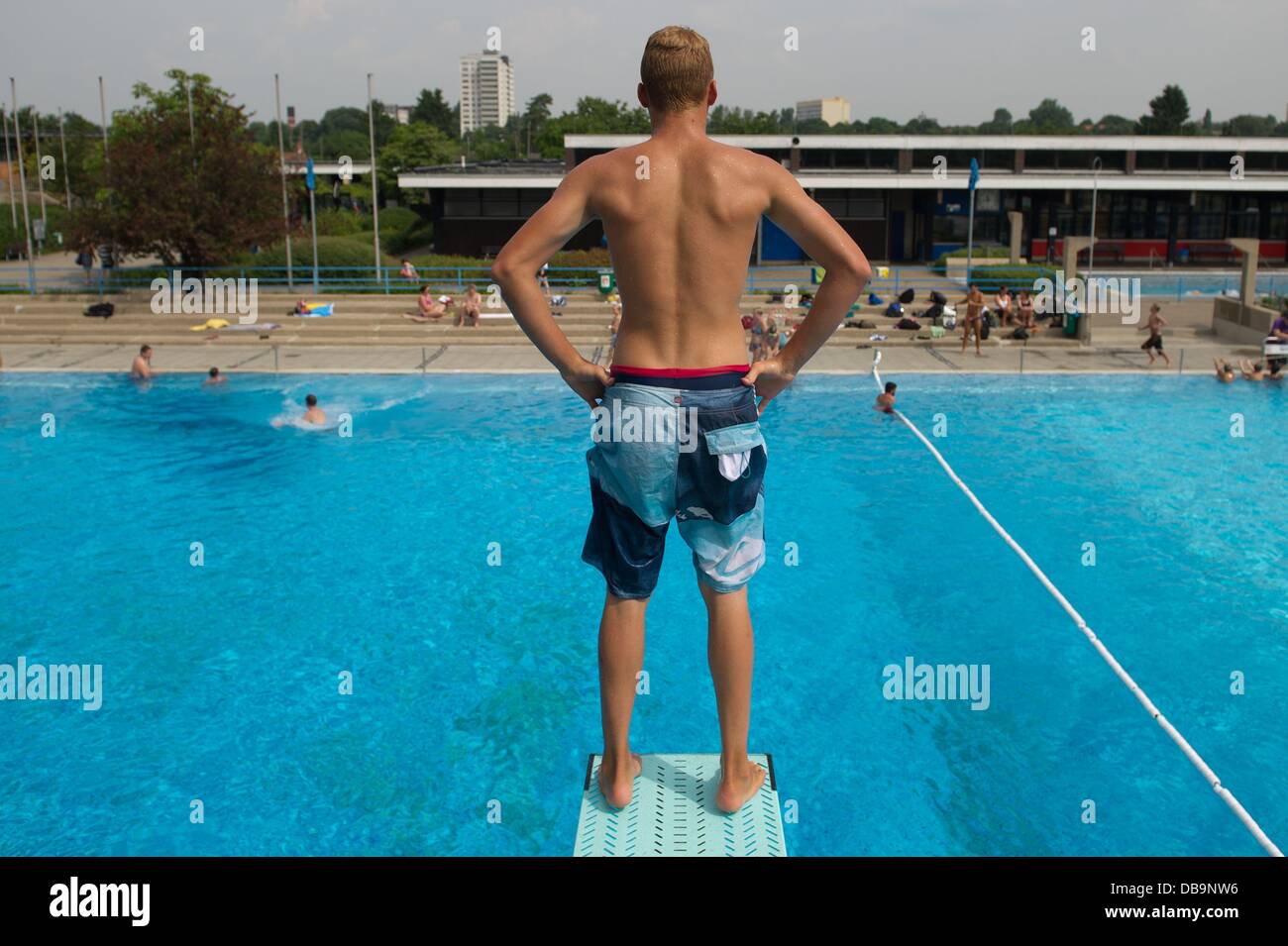 Boy on diving platform hi-res stock photography and images - Alamy