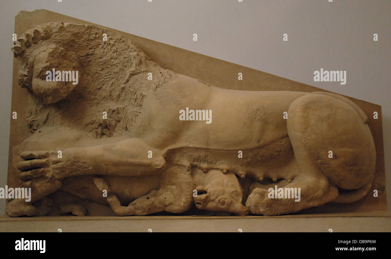 Greek art. Lioness attacking a bull. Limestone relief. Probably part of ...