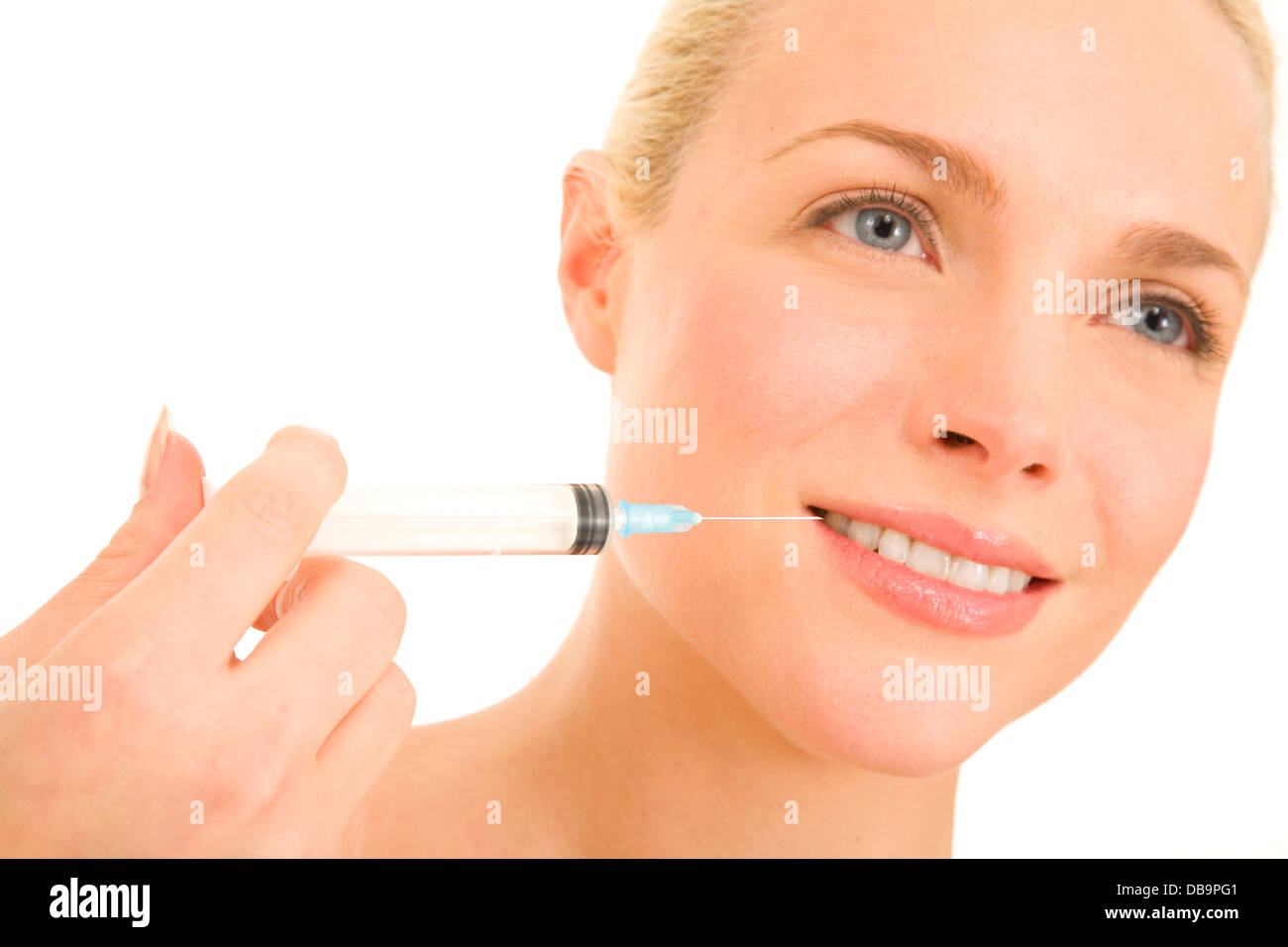 Woman with syringe of Botox Stock Photo - Alamy