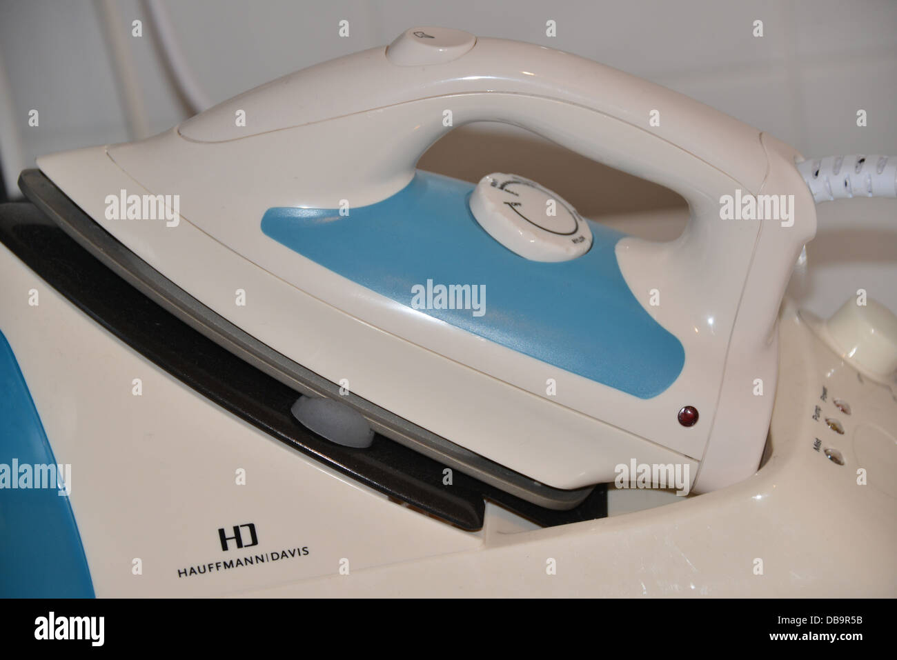 Hauffmann Davies steam iron white and blue iron Stock Photo - Alamy