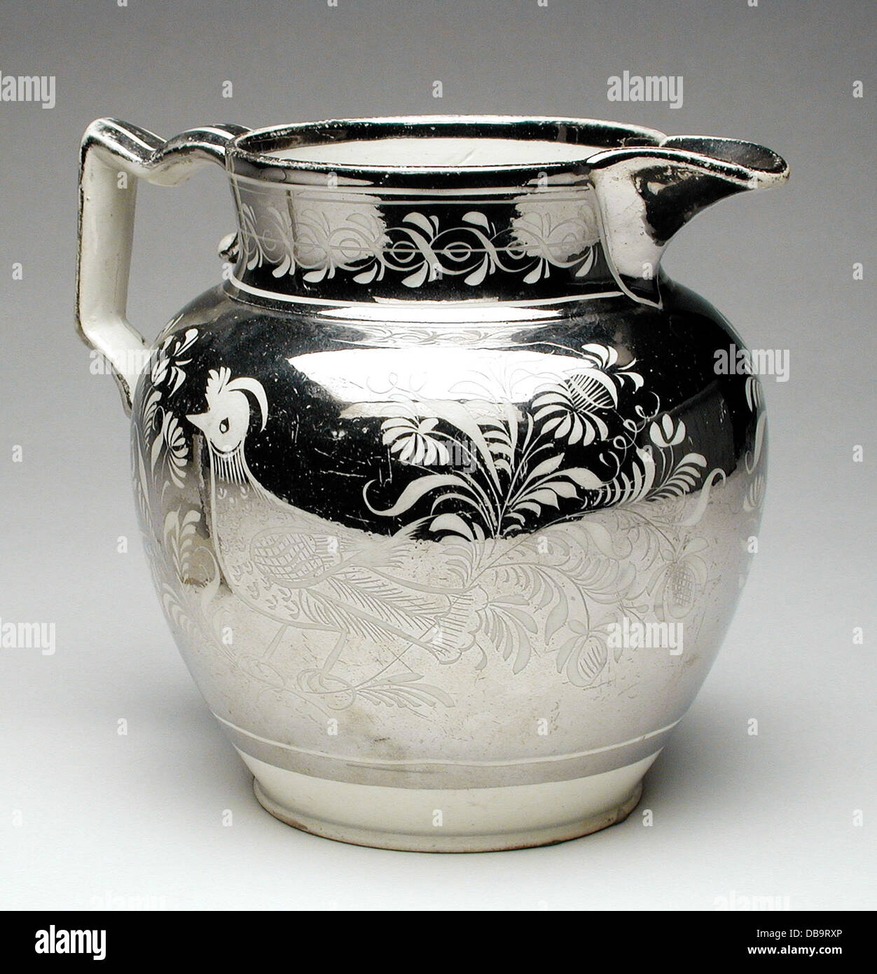 An elegantly designed pitcher from a historical period, showcasing the ...