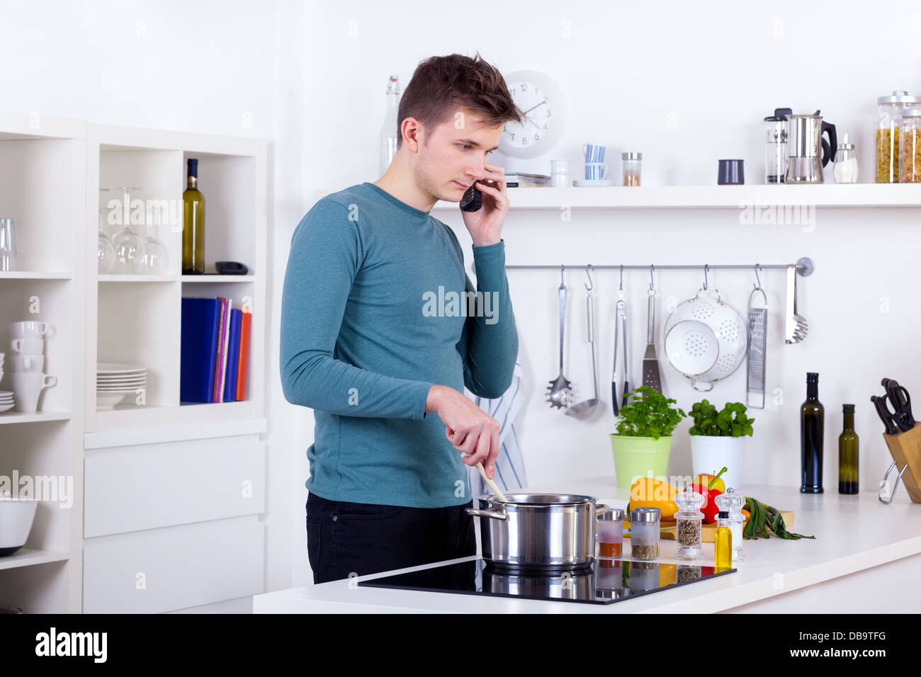 Cooking young man hi-res stock photography and images - Alamy