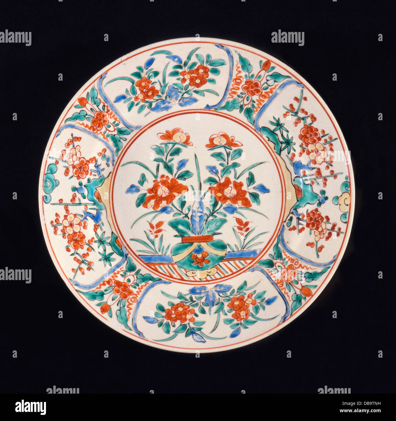 This plate, part of a larger collection, showcases traditional ...