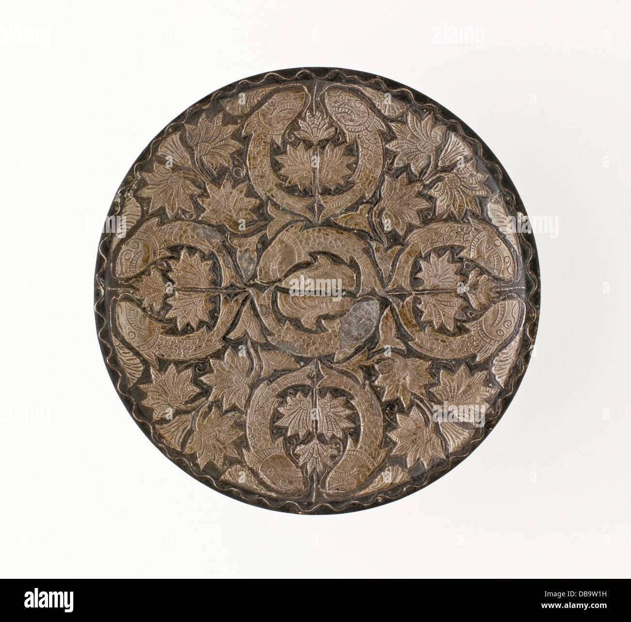 This plate features emblematic pairs of fish, a symbol commonly ...