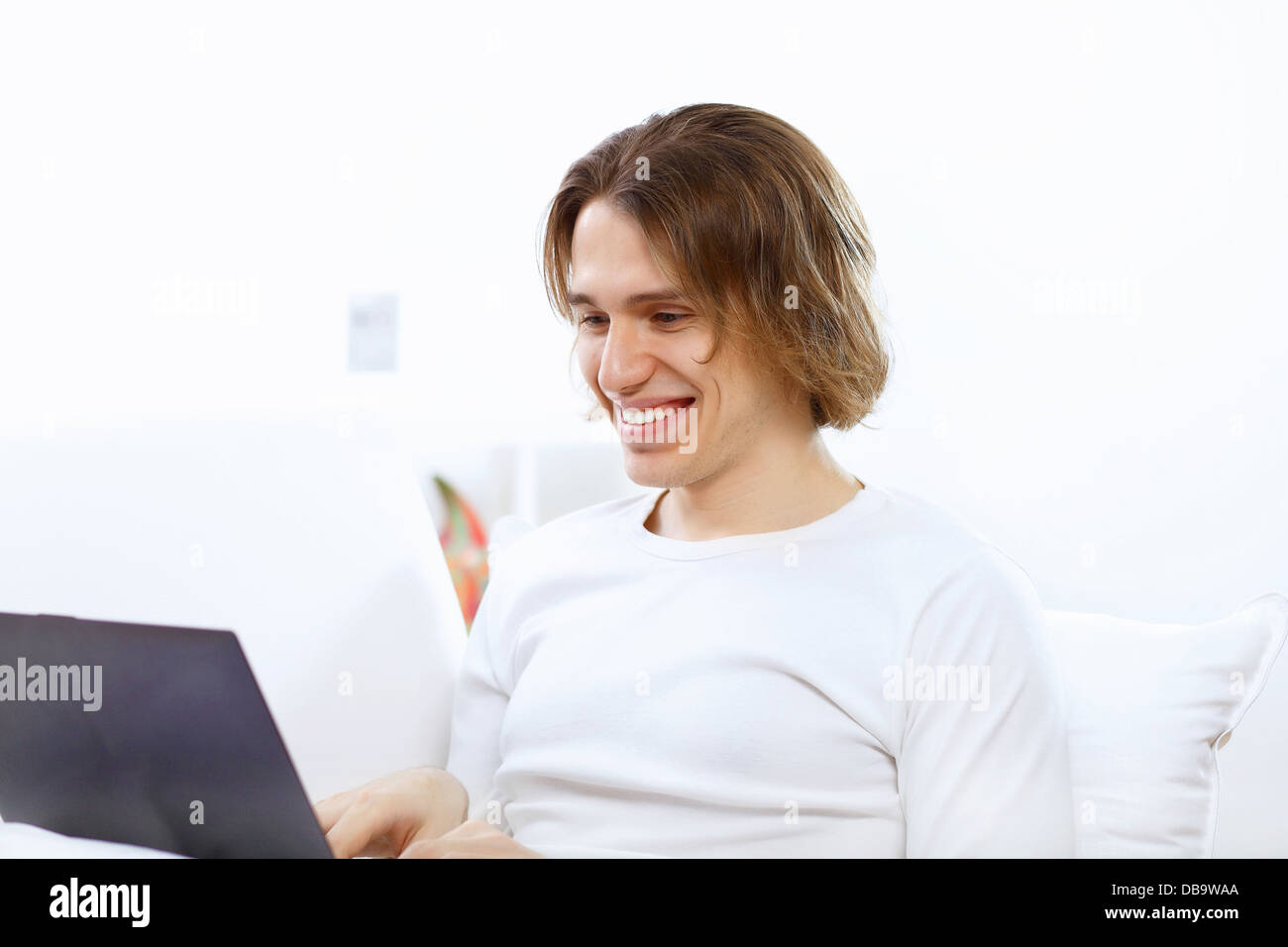 Young man with notebook Stock Photo - Alamy