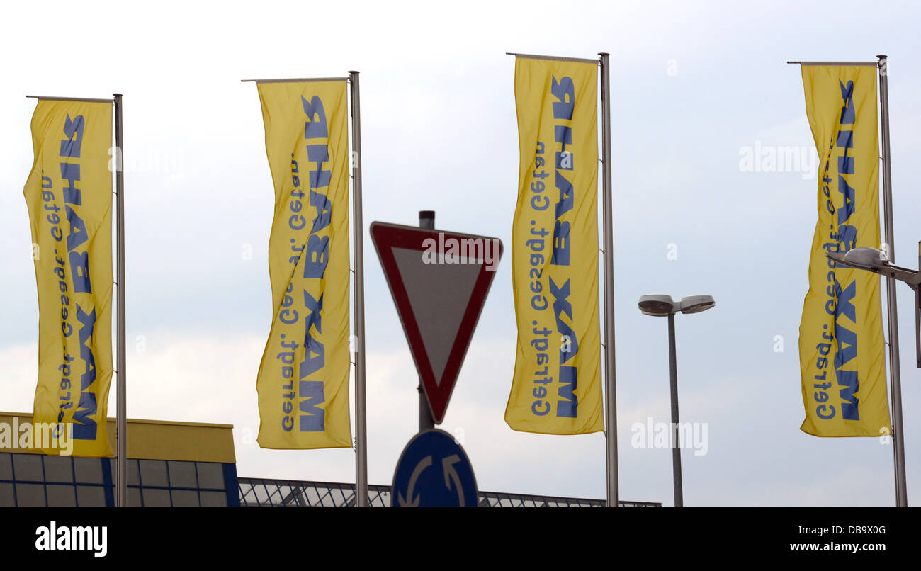 A yield sign stands in front of banners at the bankrupt hardware chain ...