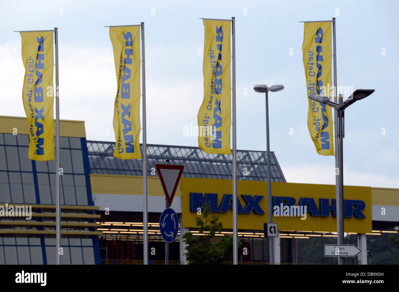 A yield sign stands in front of banners at the bankrupt hardware chain ...