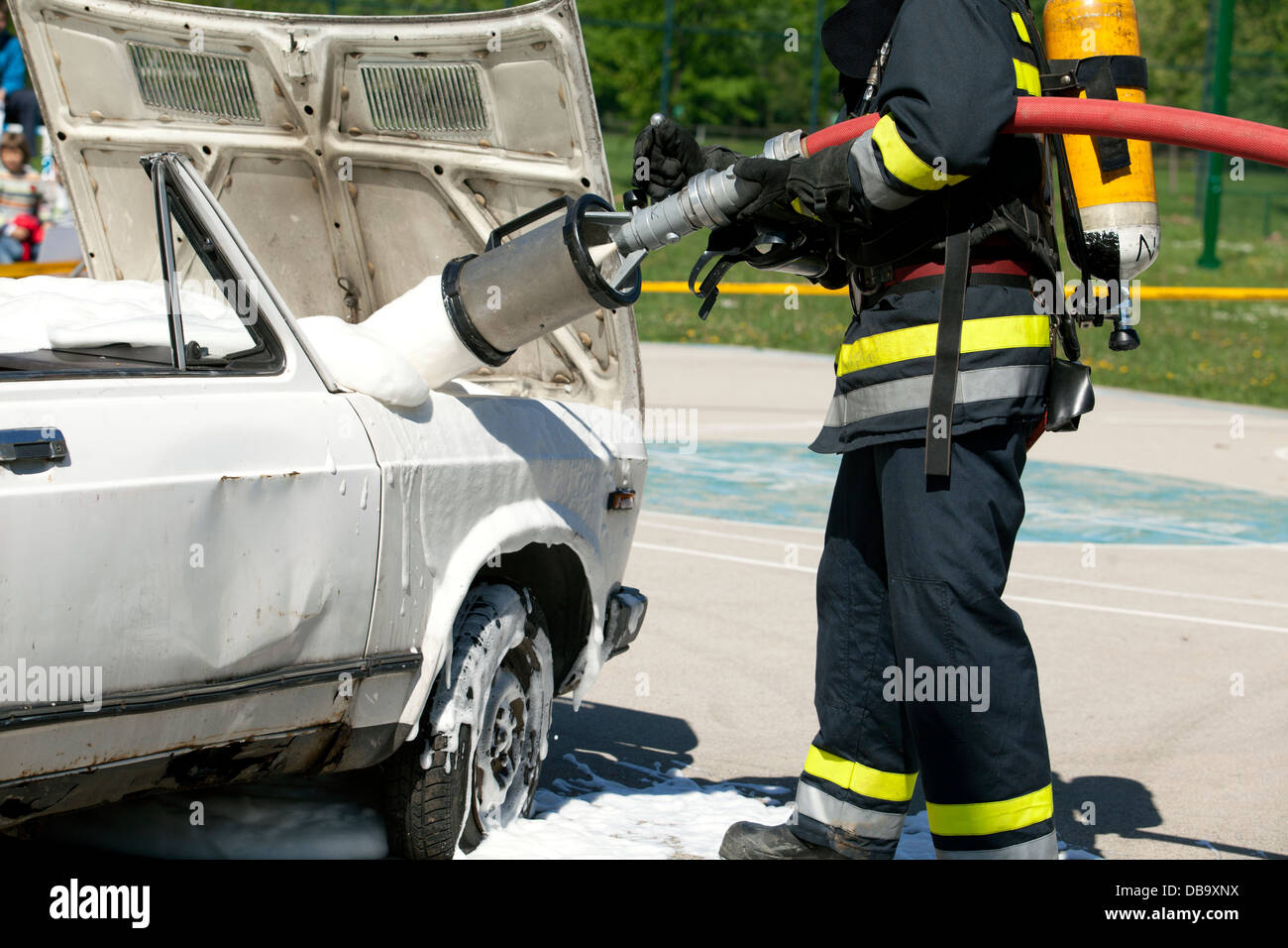 fireman in action Stock Photo - Alamy
