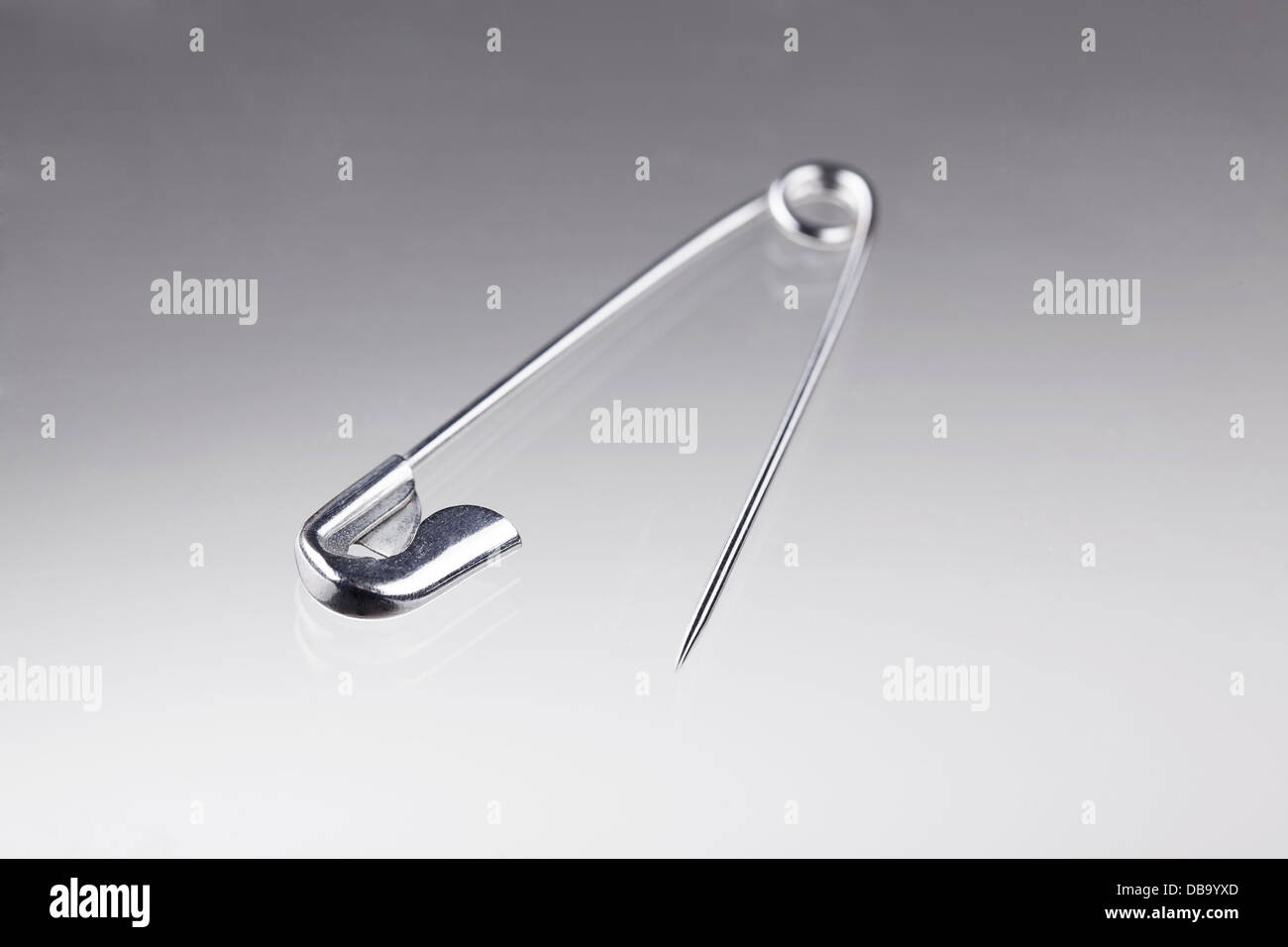 Safety pin attach hi-res stock photography and images - Alamy