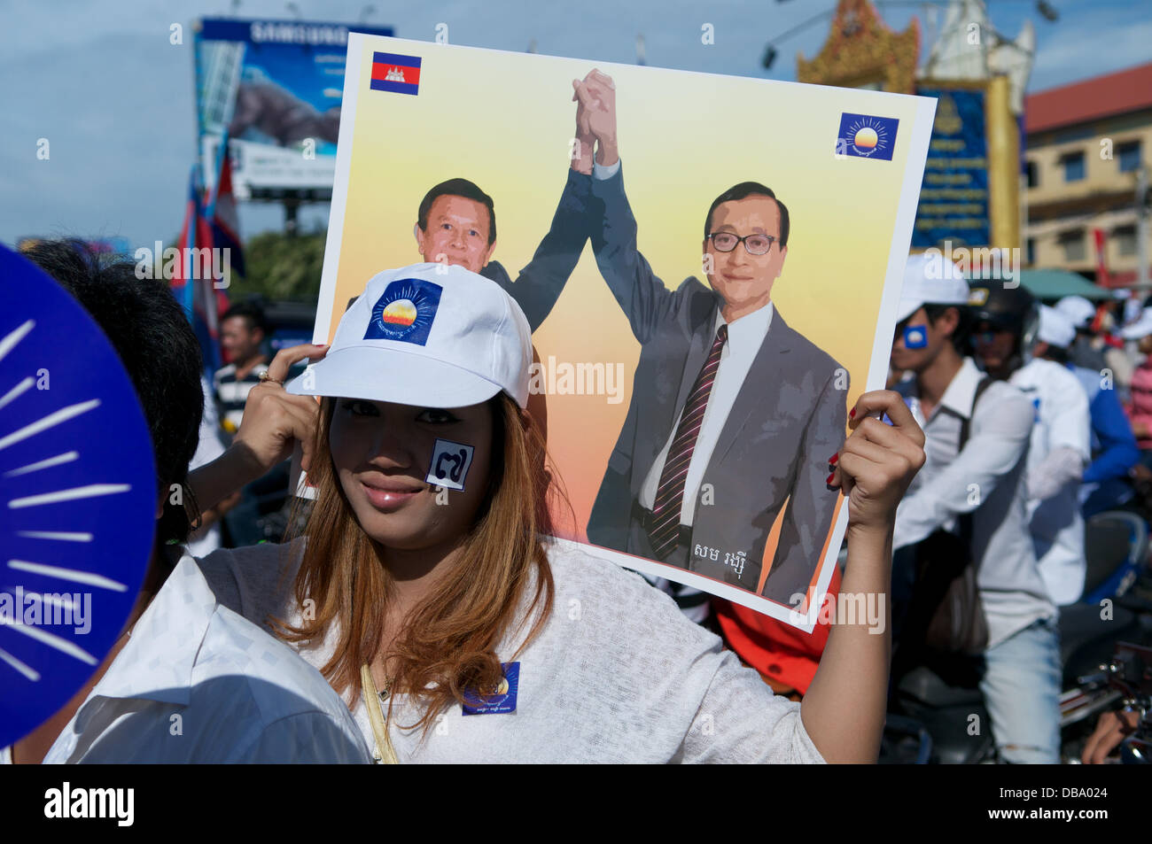 Phnom Penh, Cambodia on July. 26th, 2013. Sam Rainsy supporter holding ...