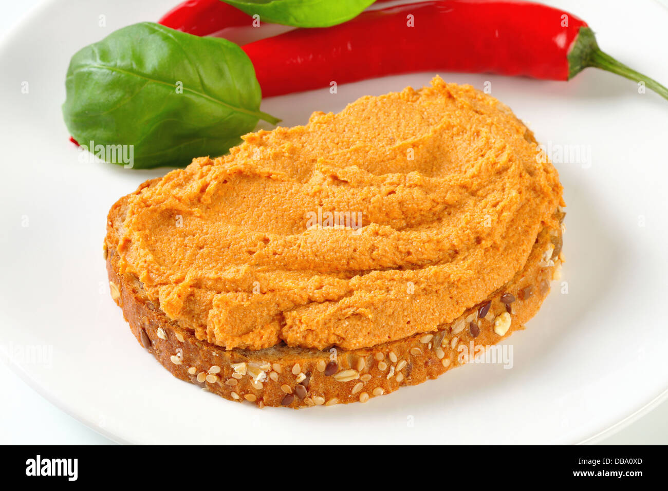 Whole grain bread with vegetable spread Stock Photo - Alamy