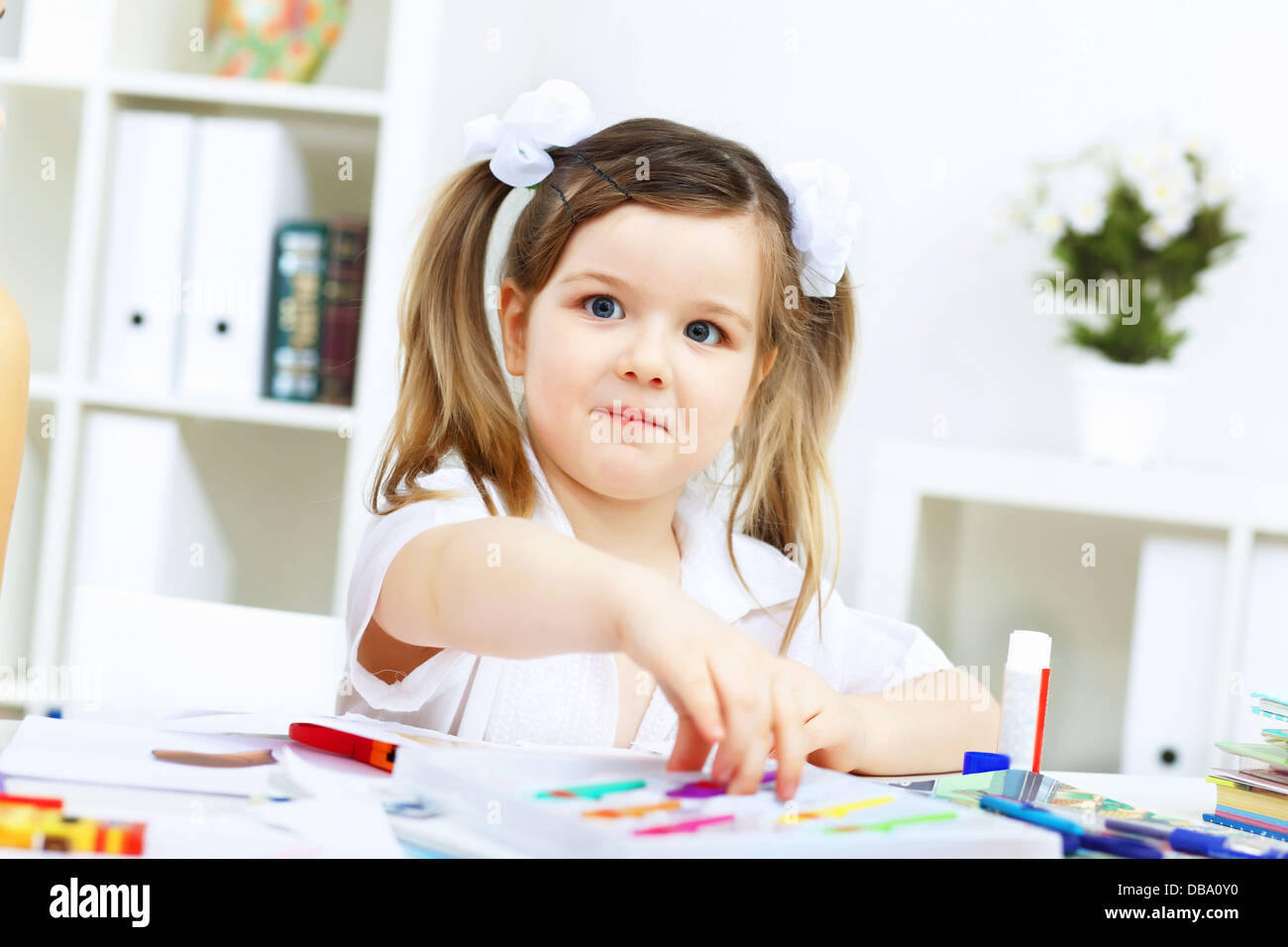 Little girl studying Stock Photo - Alamy