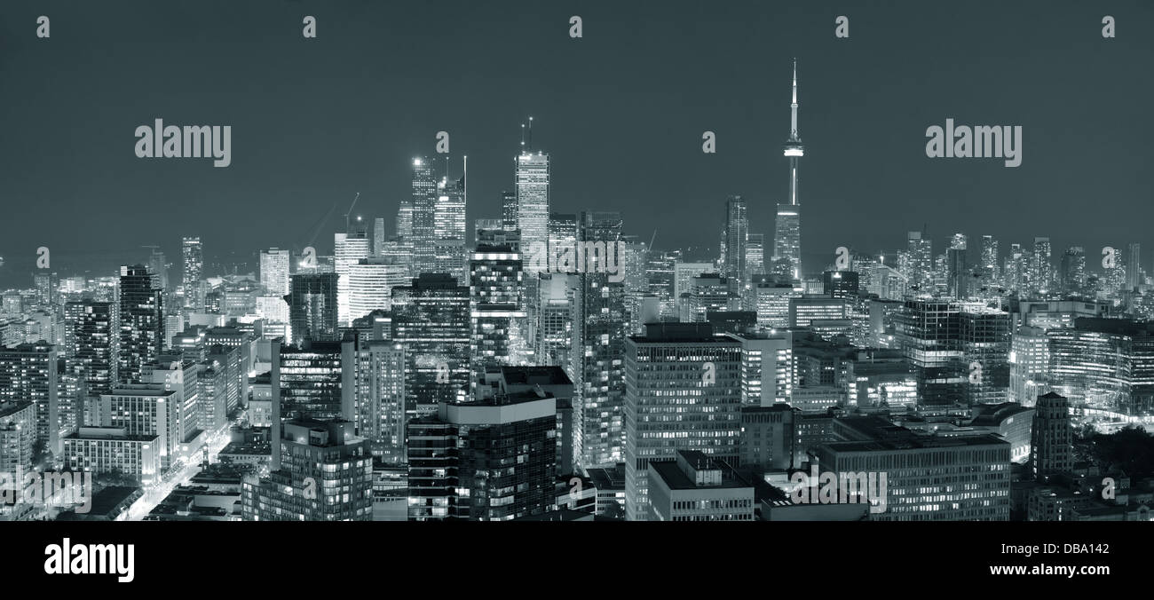 Toronto at dusk with city light and urban skyline with skyscrapers in ...