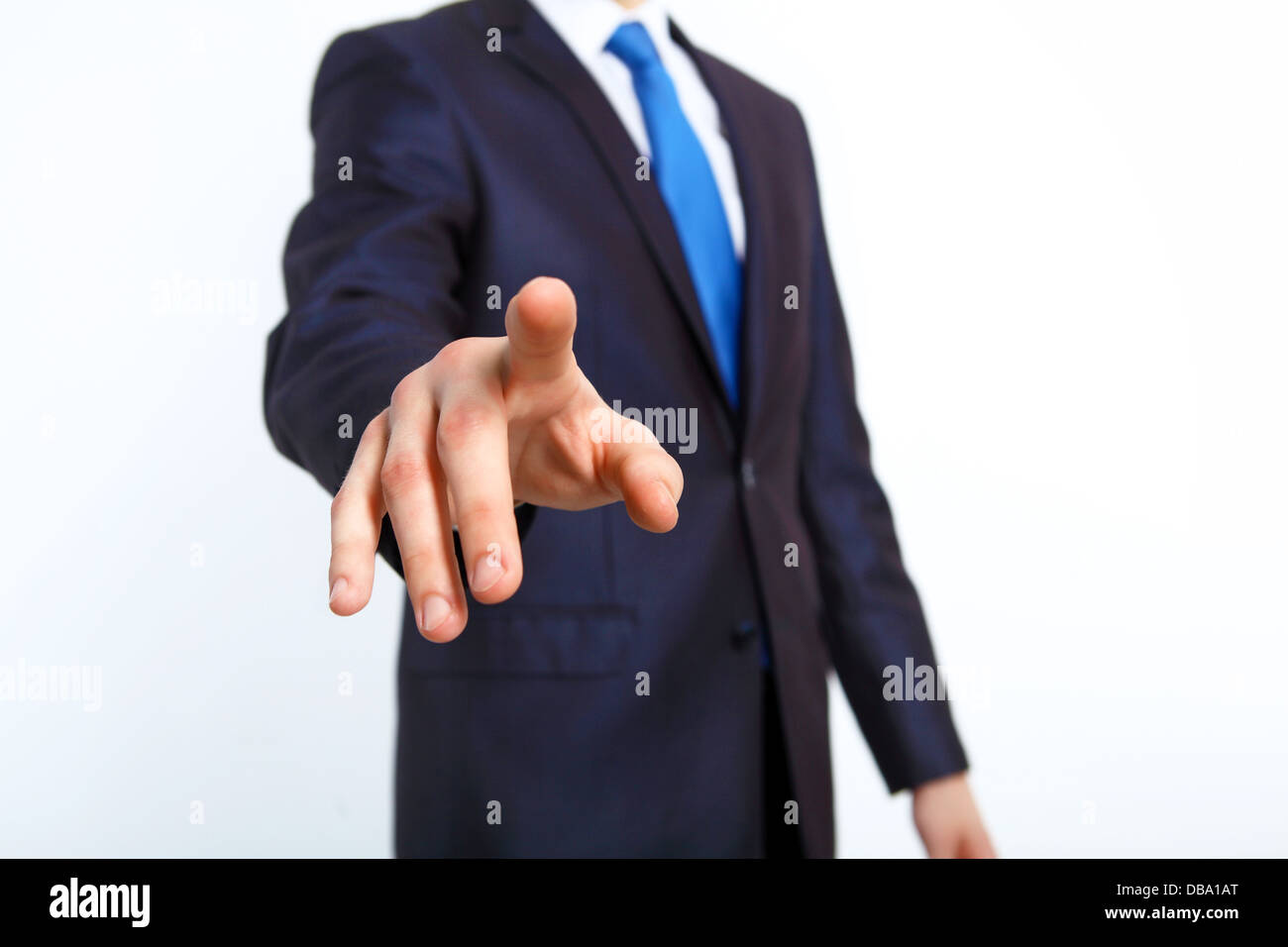 Businessman pushing a button with his finger Stock Photo - Alamy