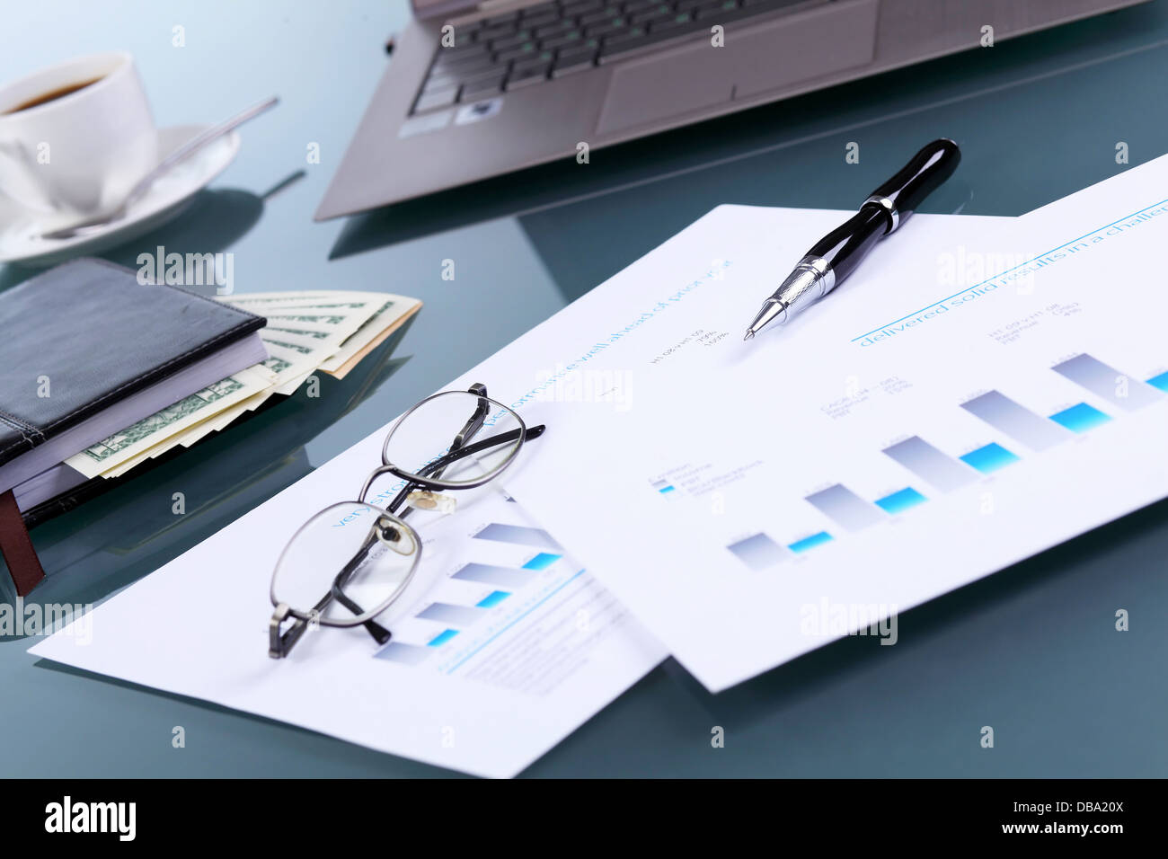 Business papers on the work place Stock Photo - Alamy