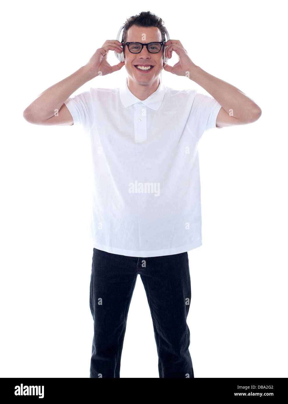 Smiling man enjoying music Cut Out Stock Images & Pictures - Alamy