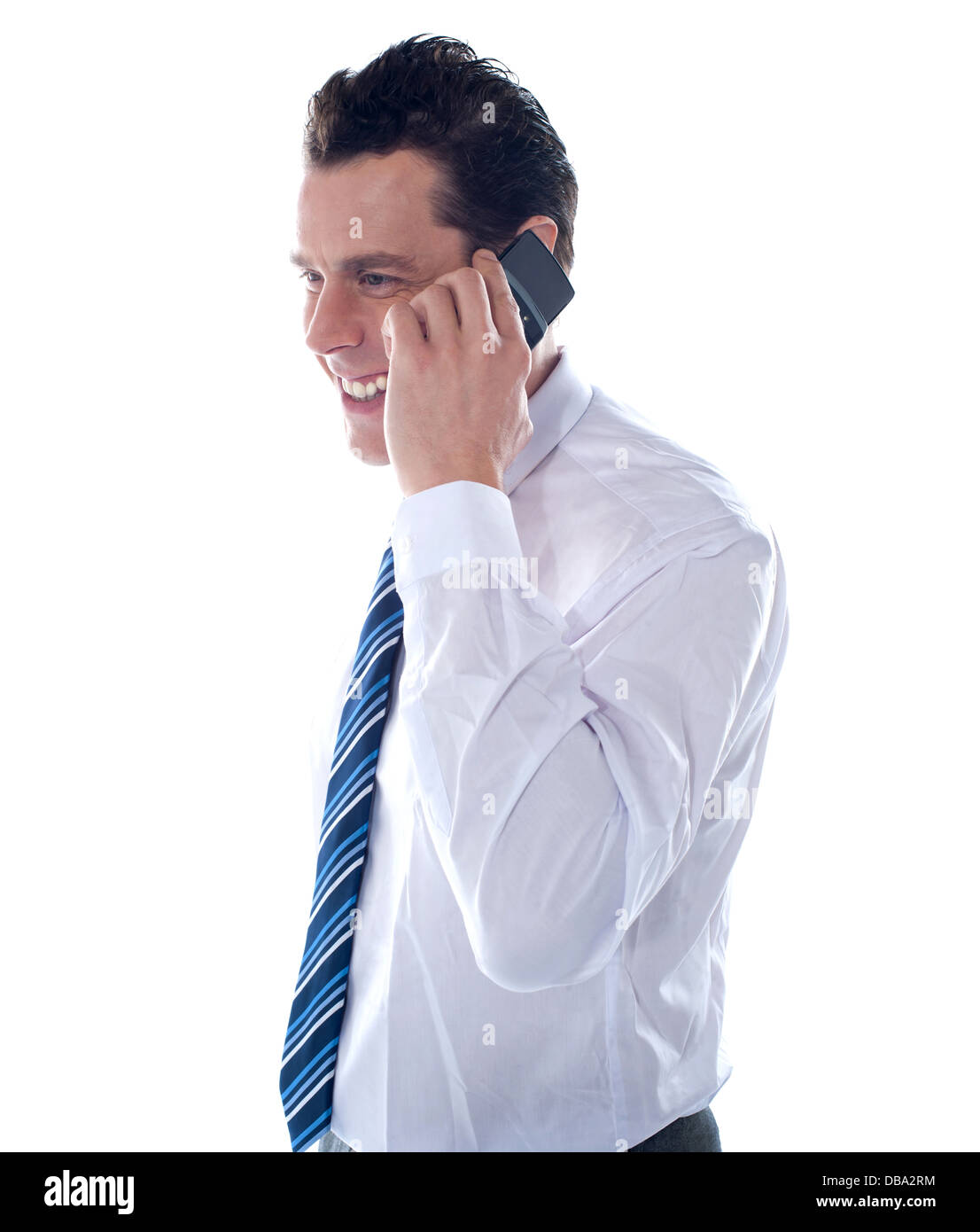 Side view of manager attending phone call Stock Photo - Alamy