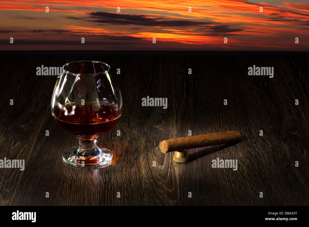 Glass of cognac and sigar Stock Photo - Alamy