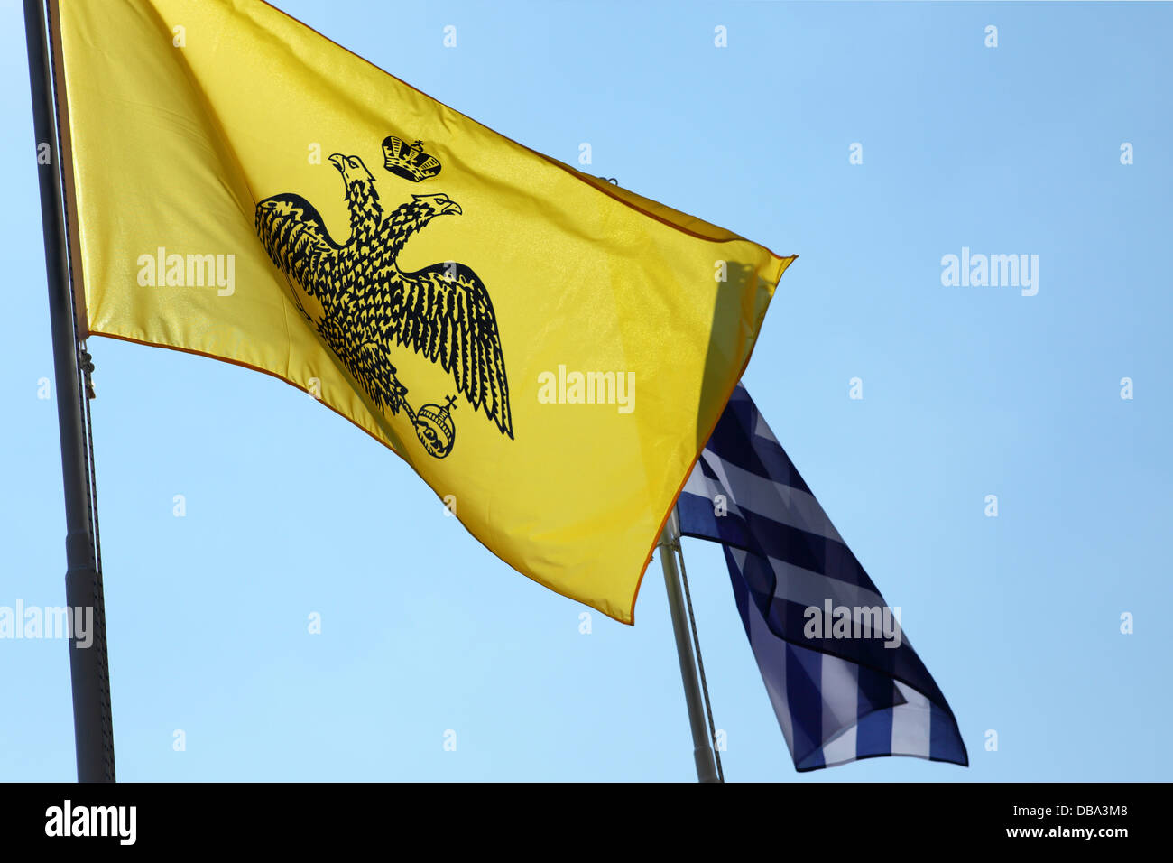 The flags of the Greek Orthodox Church and national flag of Greece fly ...