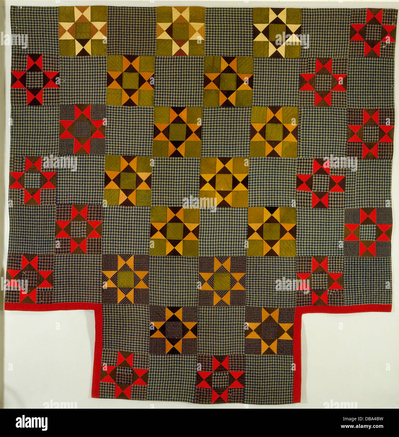 This quilt, designed for a four-poster bed, features an intricate ...