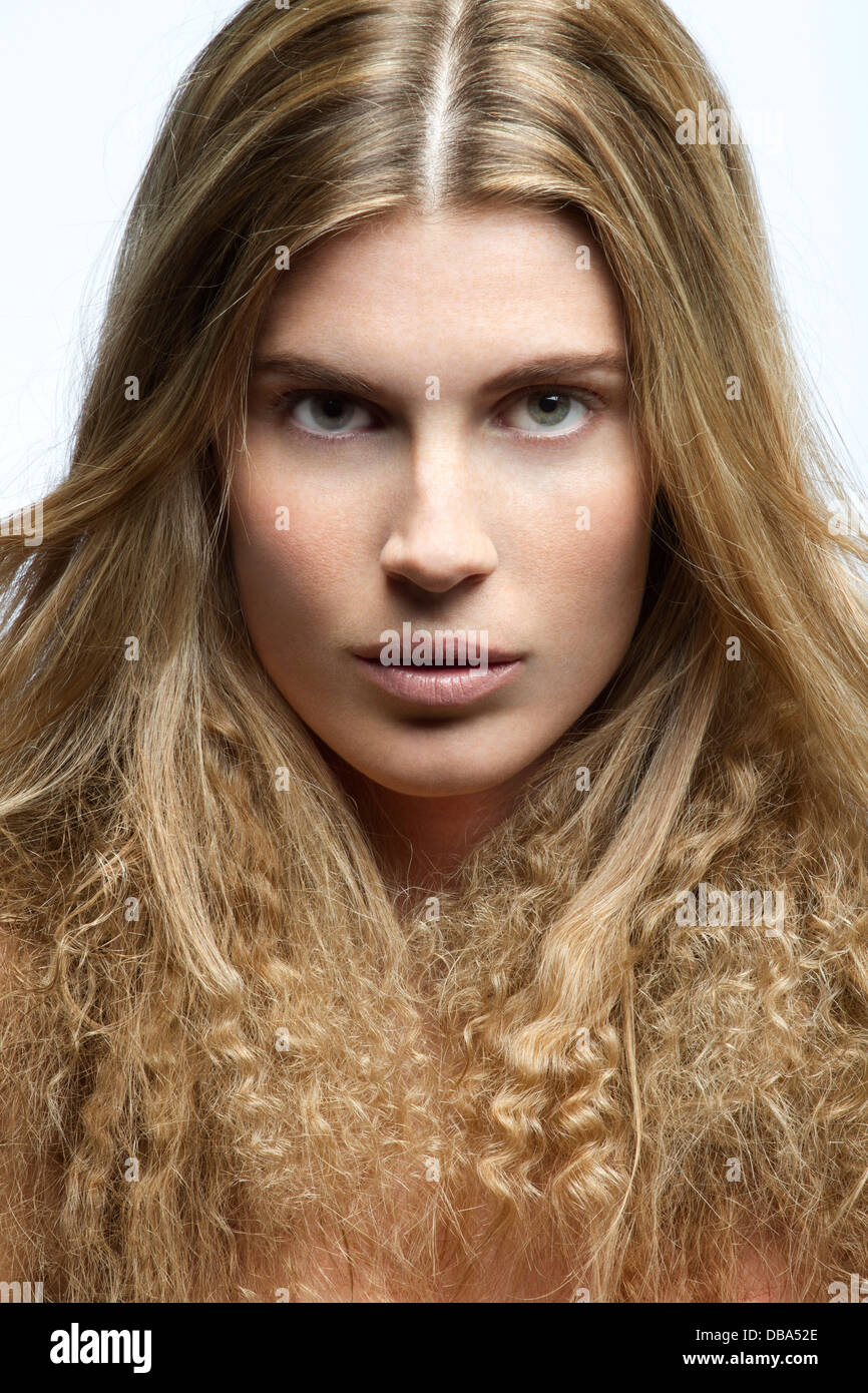 Beauty portrait of a female model with styled hair Stock Photo - Alamy