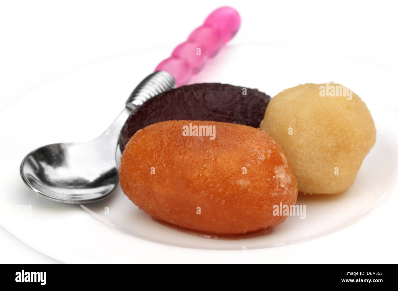 Sweetmeat of different types with spoon Stock Photo - Alamy