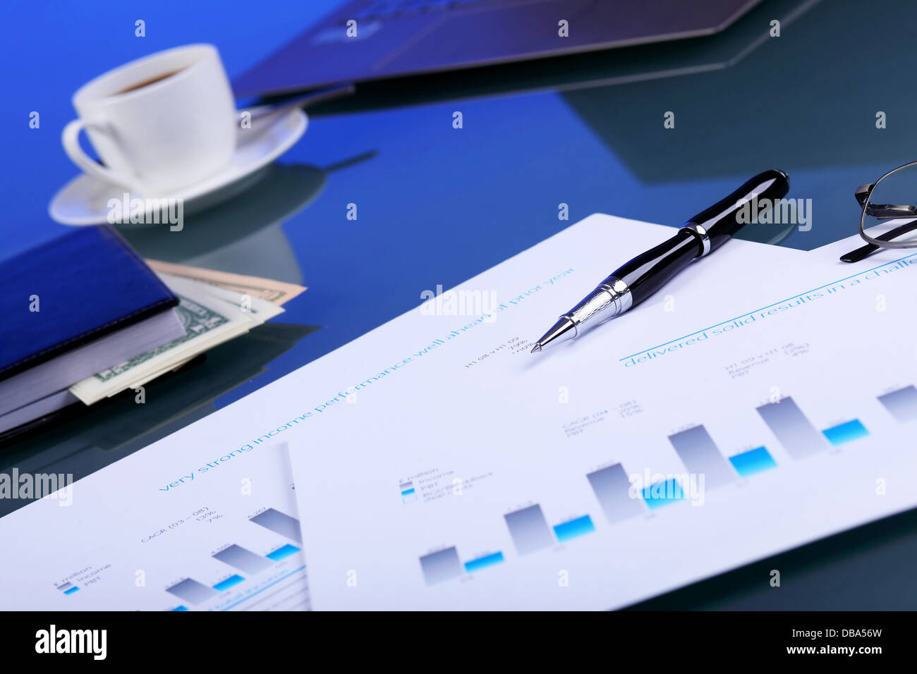 Business papers on the work place Stock Photo - Alamy