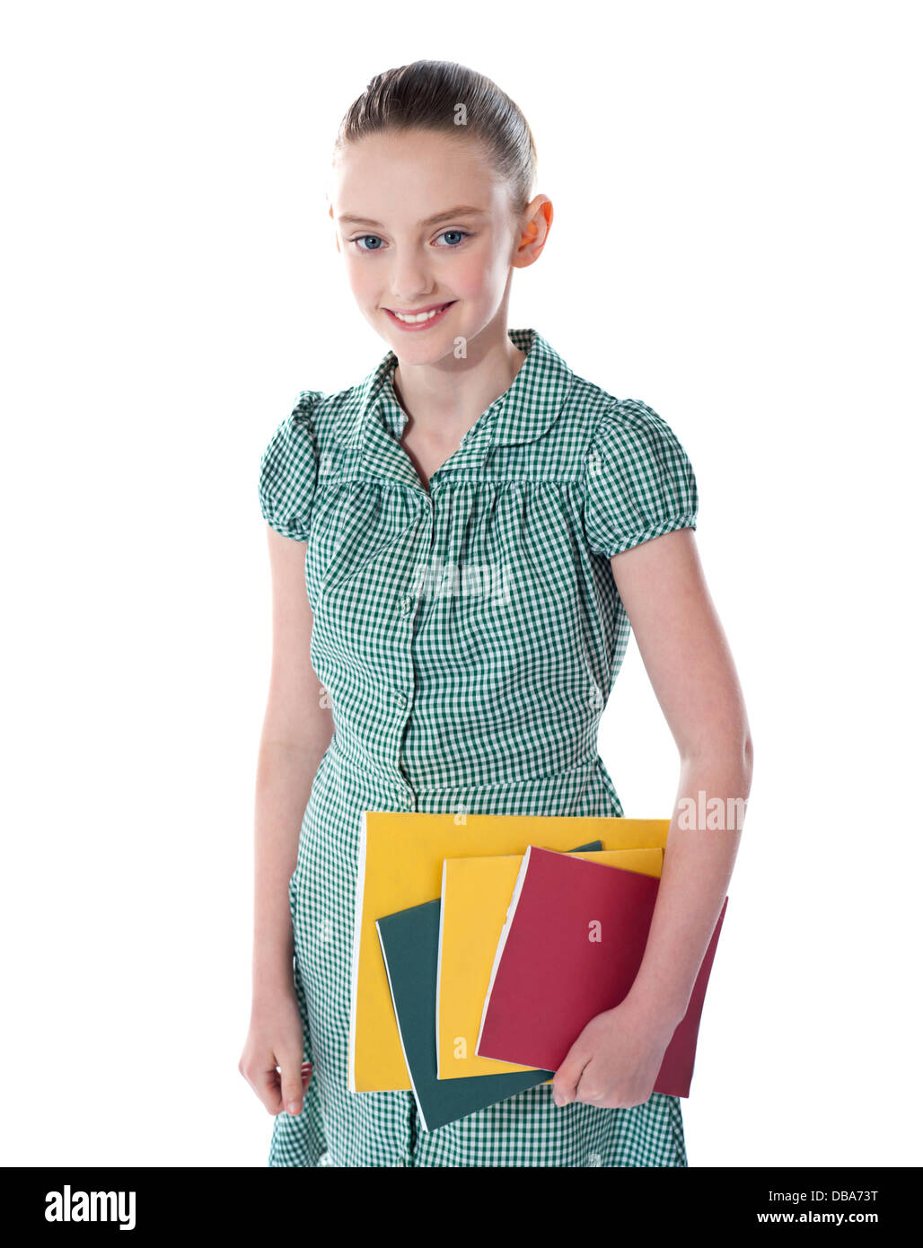 School girl carrying books in hand Stock Photo - Alamy