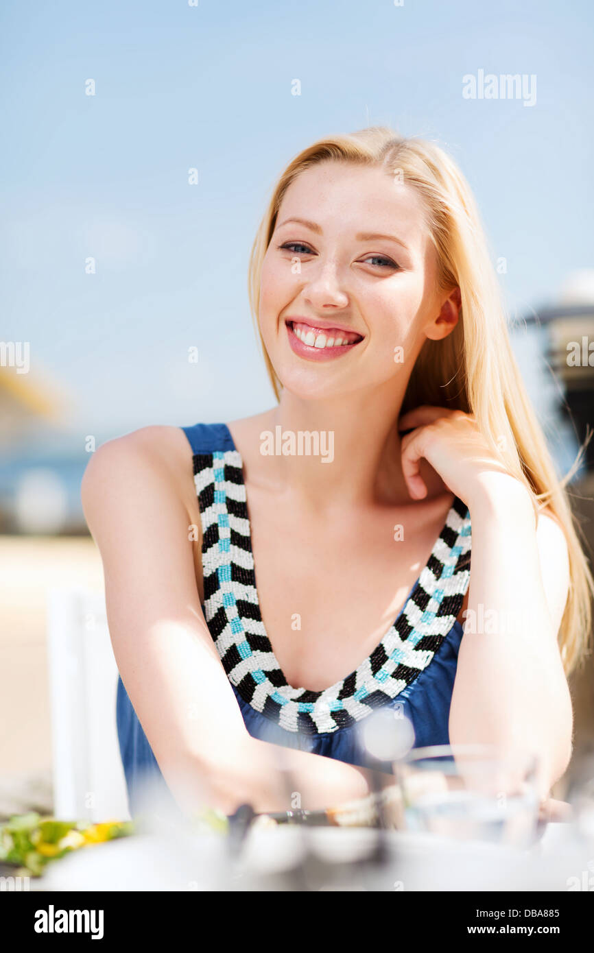 girl in cafe on the beach Stock Photo - Alamy