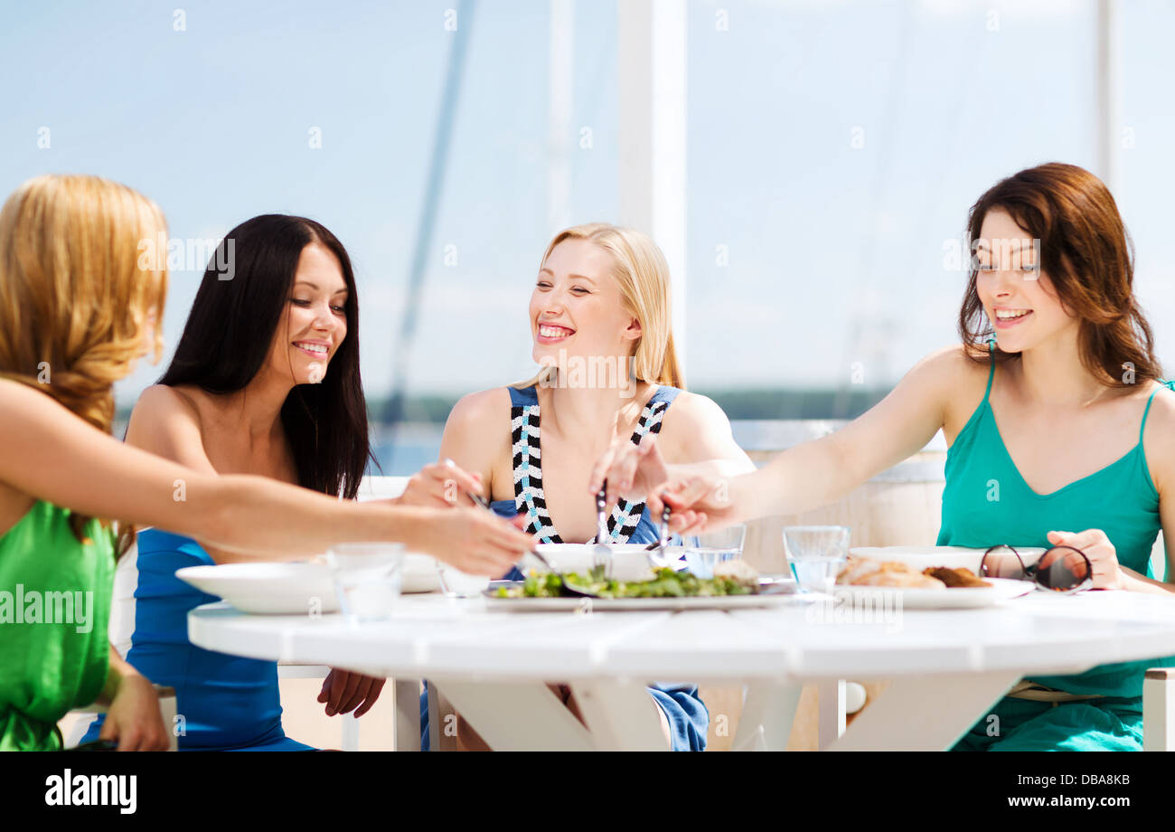 girls in cafe on the beach Stock Photo - Alamy