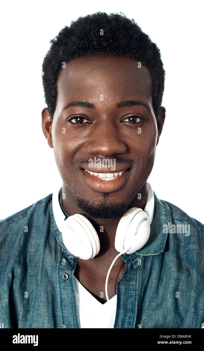 Guy with headphones around his neck Stock Photo - Alamy