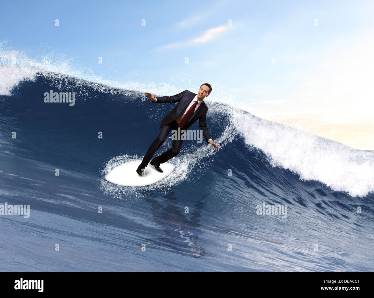 Young business person surfing on the waves Stock Photo - Alamy