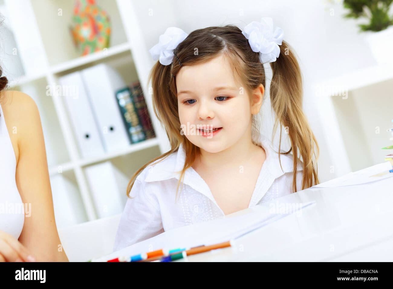 Little girl studying Stock Photo - Alamy