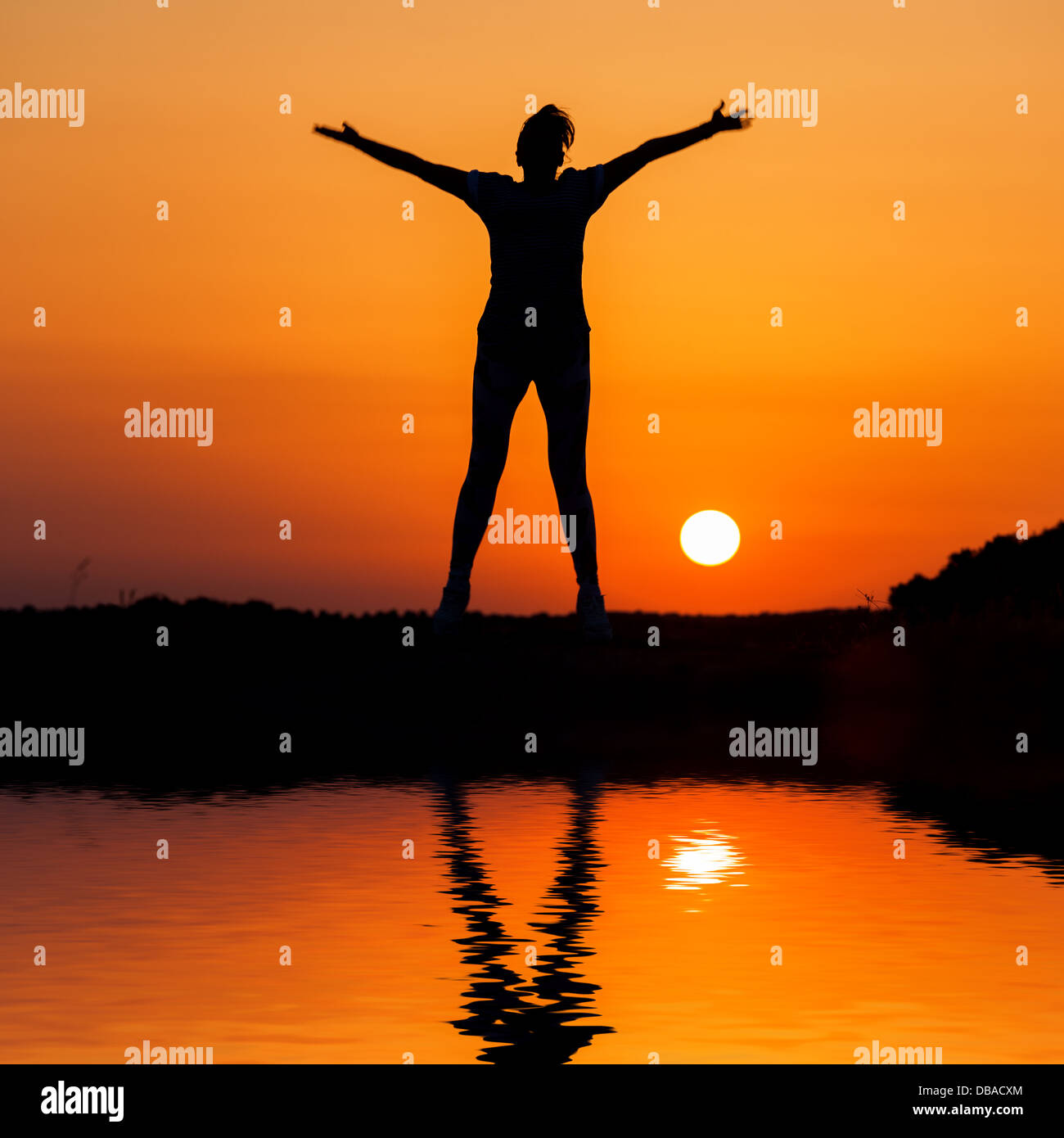 Person jumping into water sunset hi-res stock photography and images ...