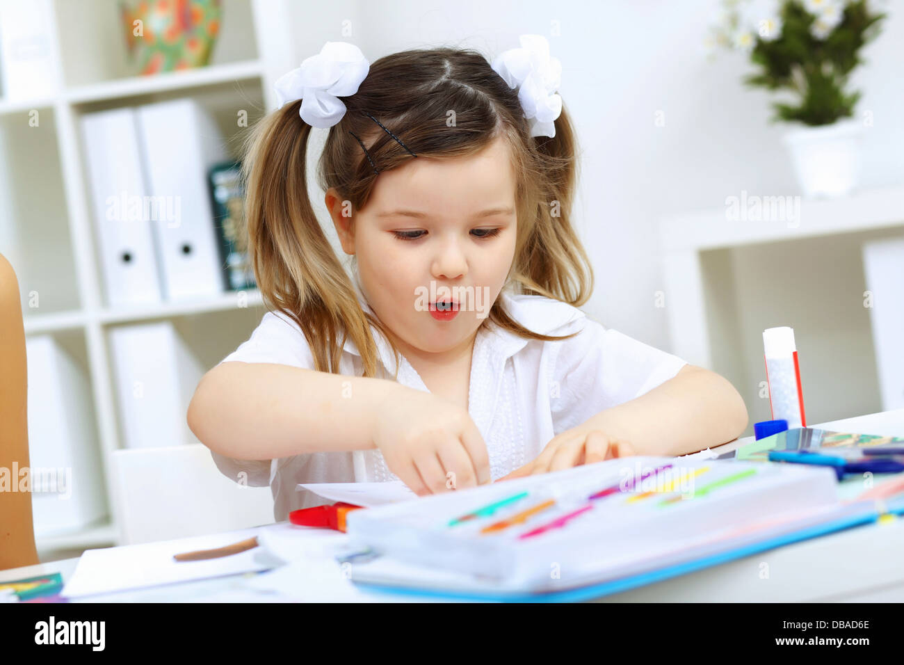 Little girl studying Stock Photo - Alamy