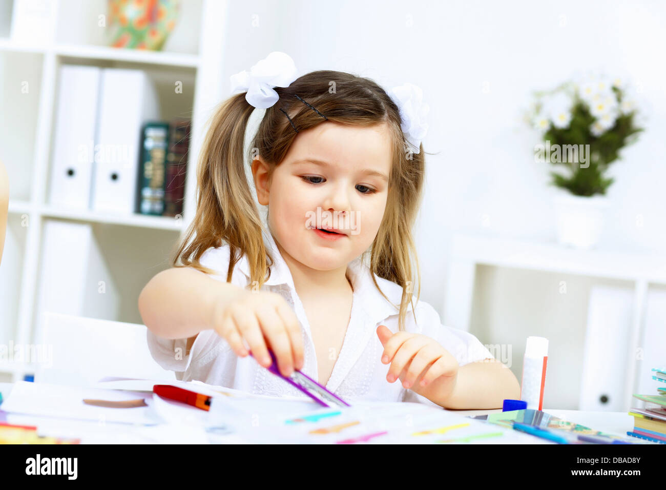 Little girl studying Stock Photo - Alamy
