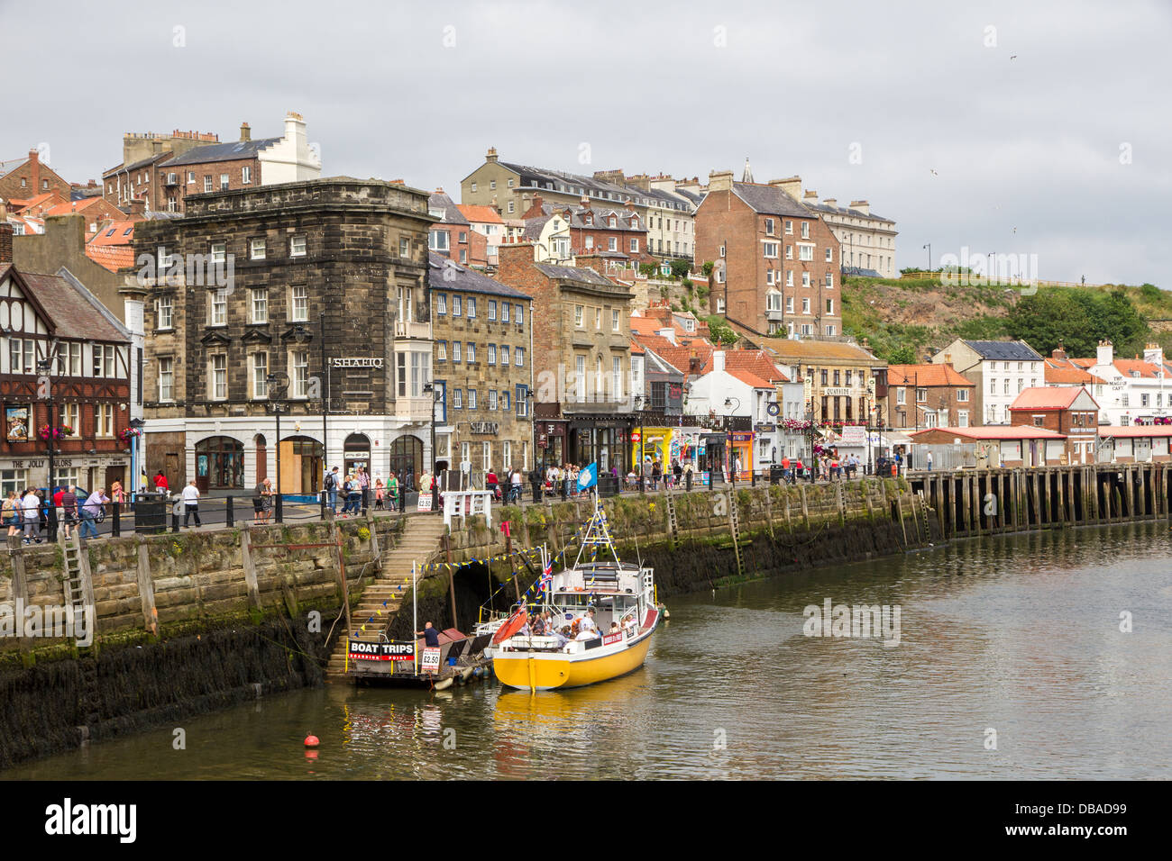 Shops and The Fish Quay at Whitby Harbour, North Yorkshire Stock Photo ...